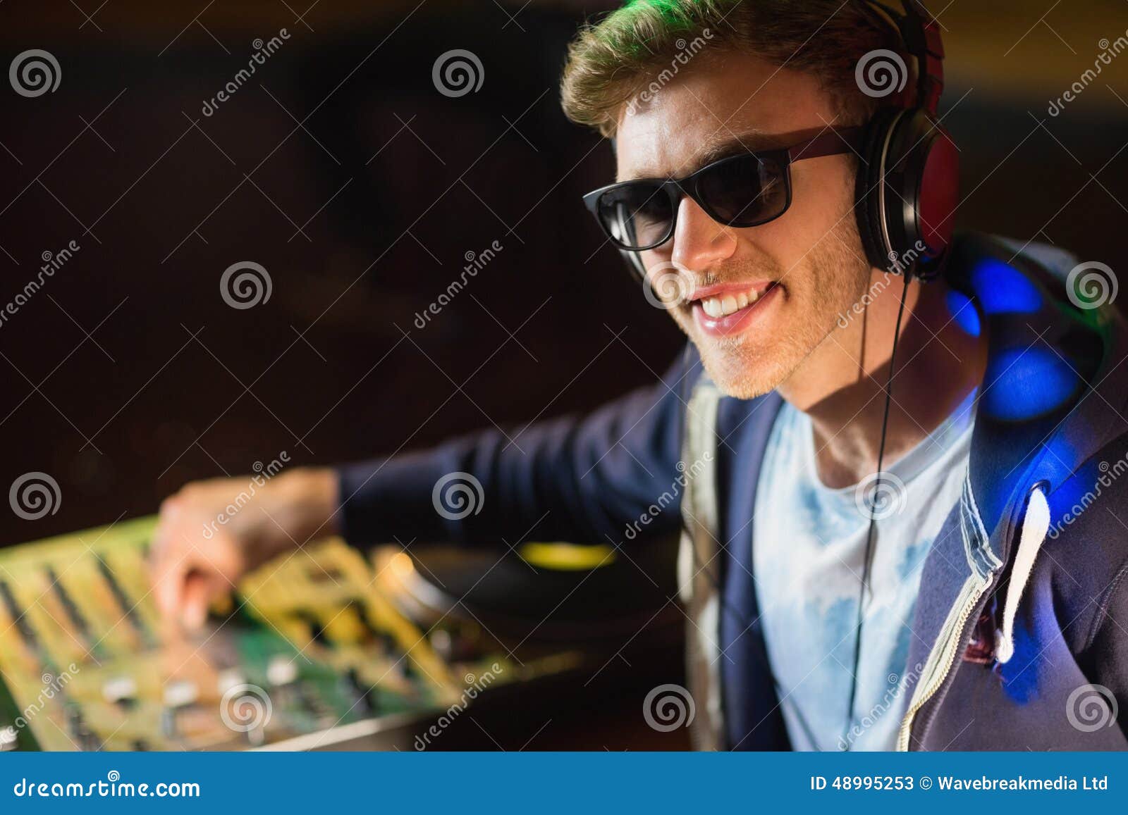 Cool dj smiling at camera stock image. Image of male - 48995253
