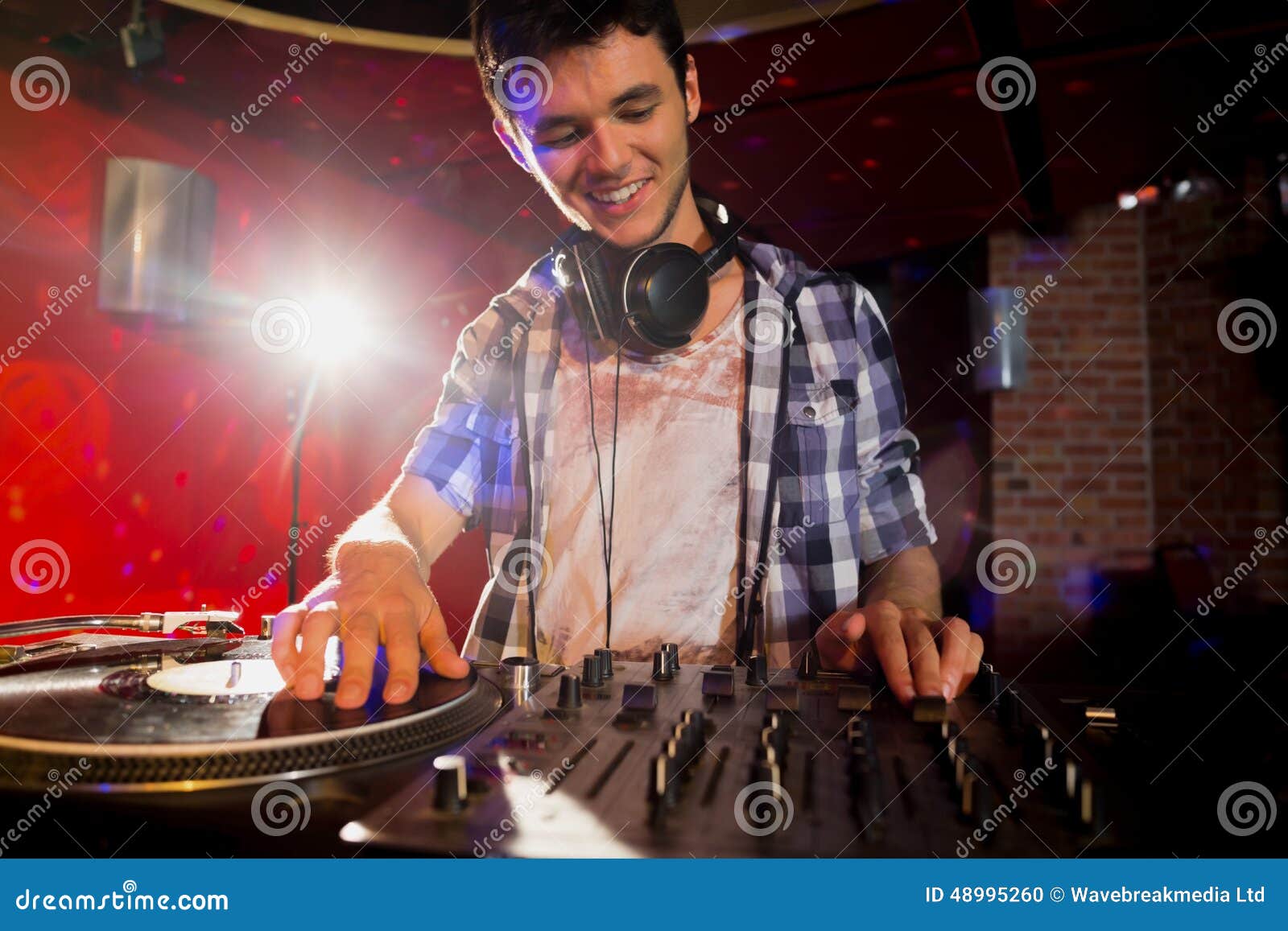 Cool dj spinning the decks stock photo. Image of adult - 48995260