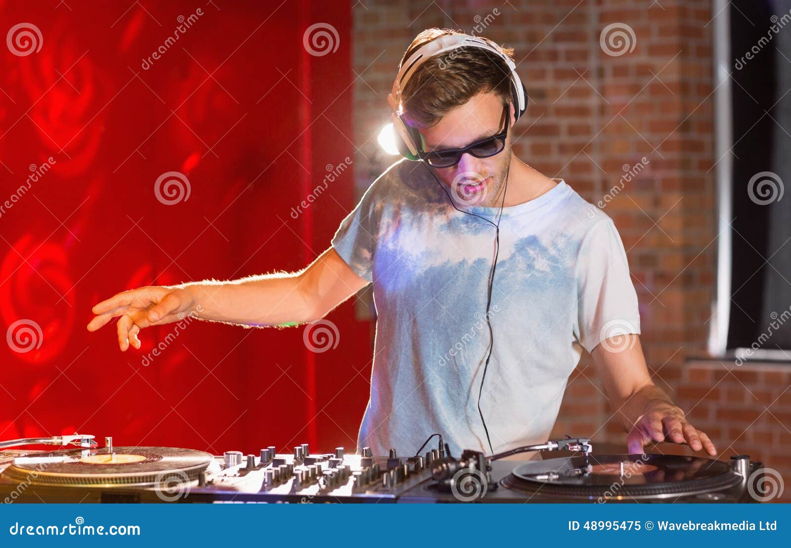 Cool dj spinning the decks stock image. Image of smiling - 48995475