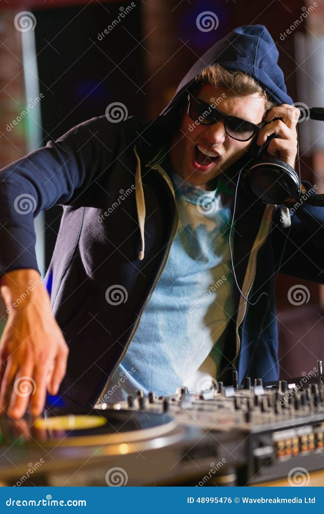 Cool dj spinning the decks stock photo. Image of club - 48995476