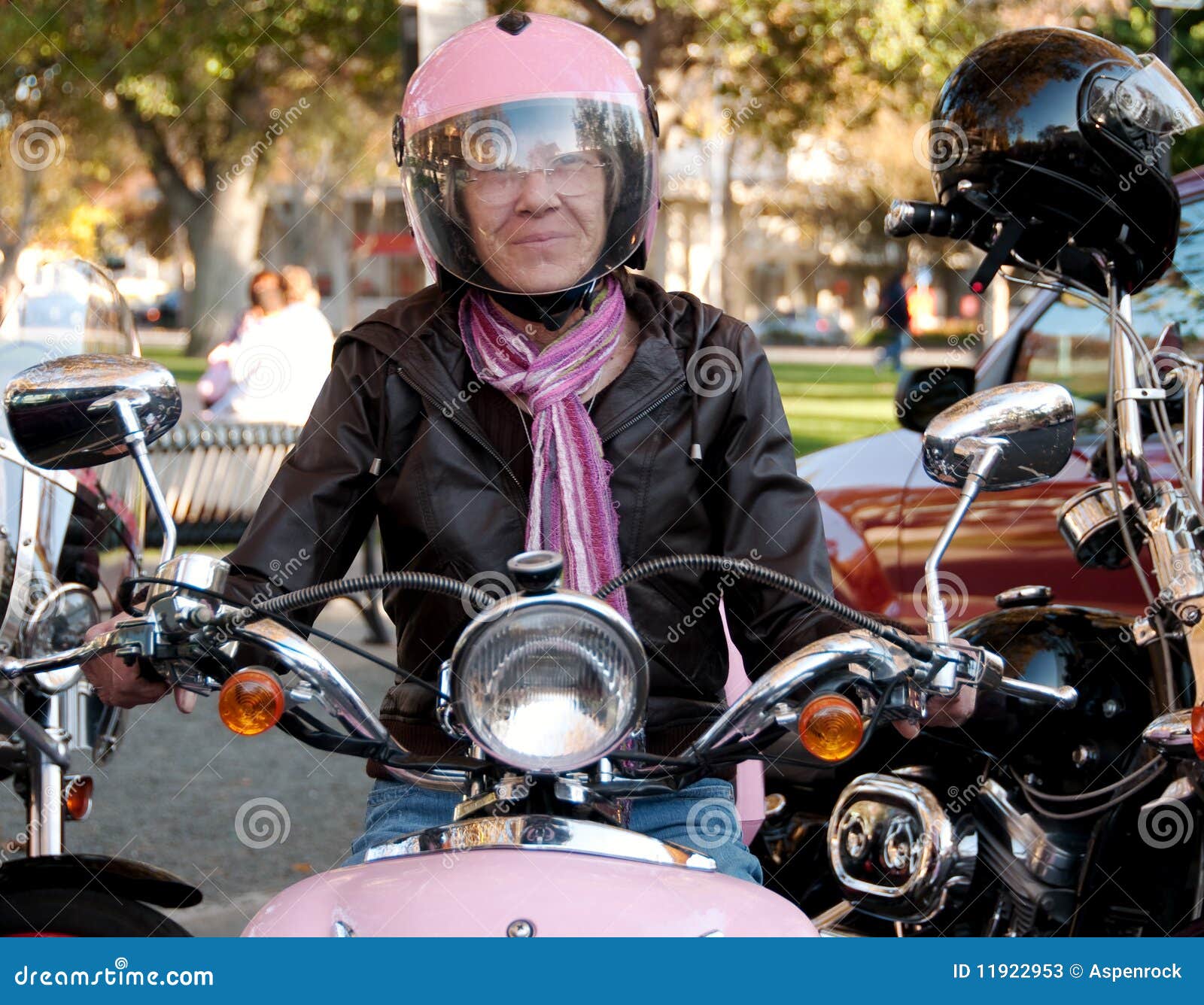 Cool female biker stock image. Image of visor, pavement - 11922953