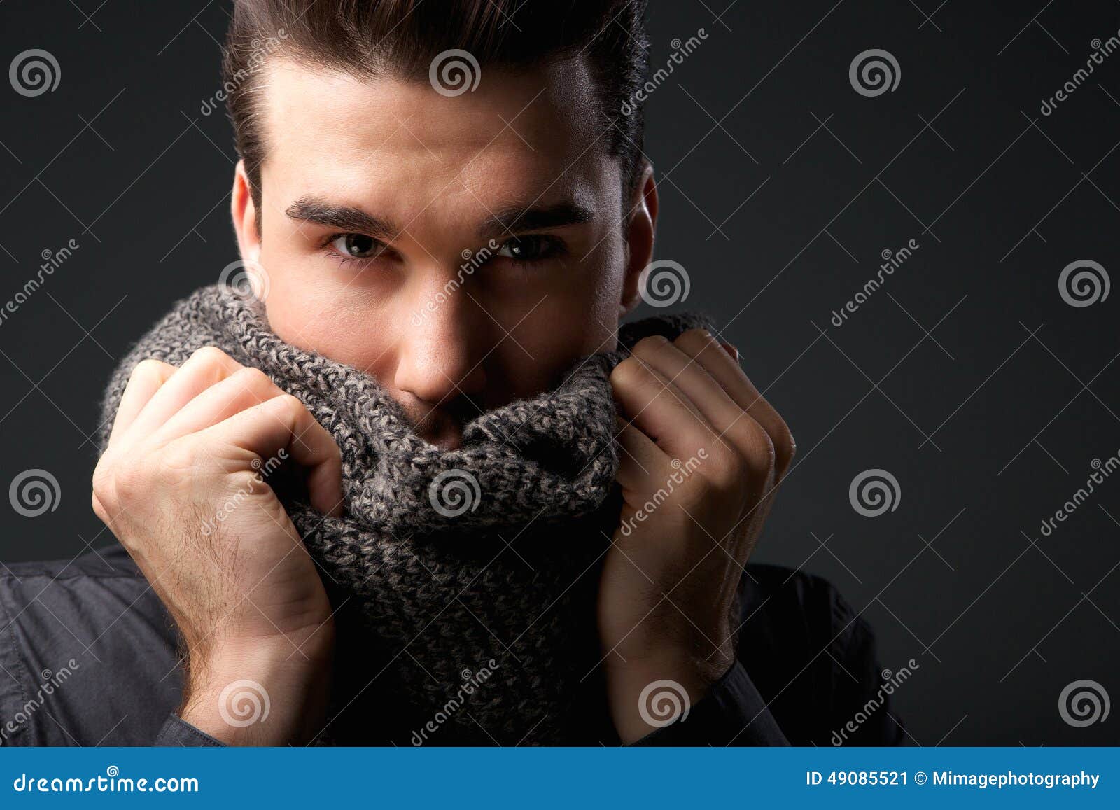 Cool Guy Holding Grey Wool Scarf Over Face Stock Image - Image of male ...