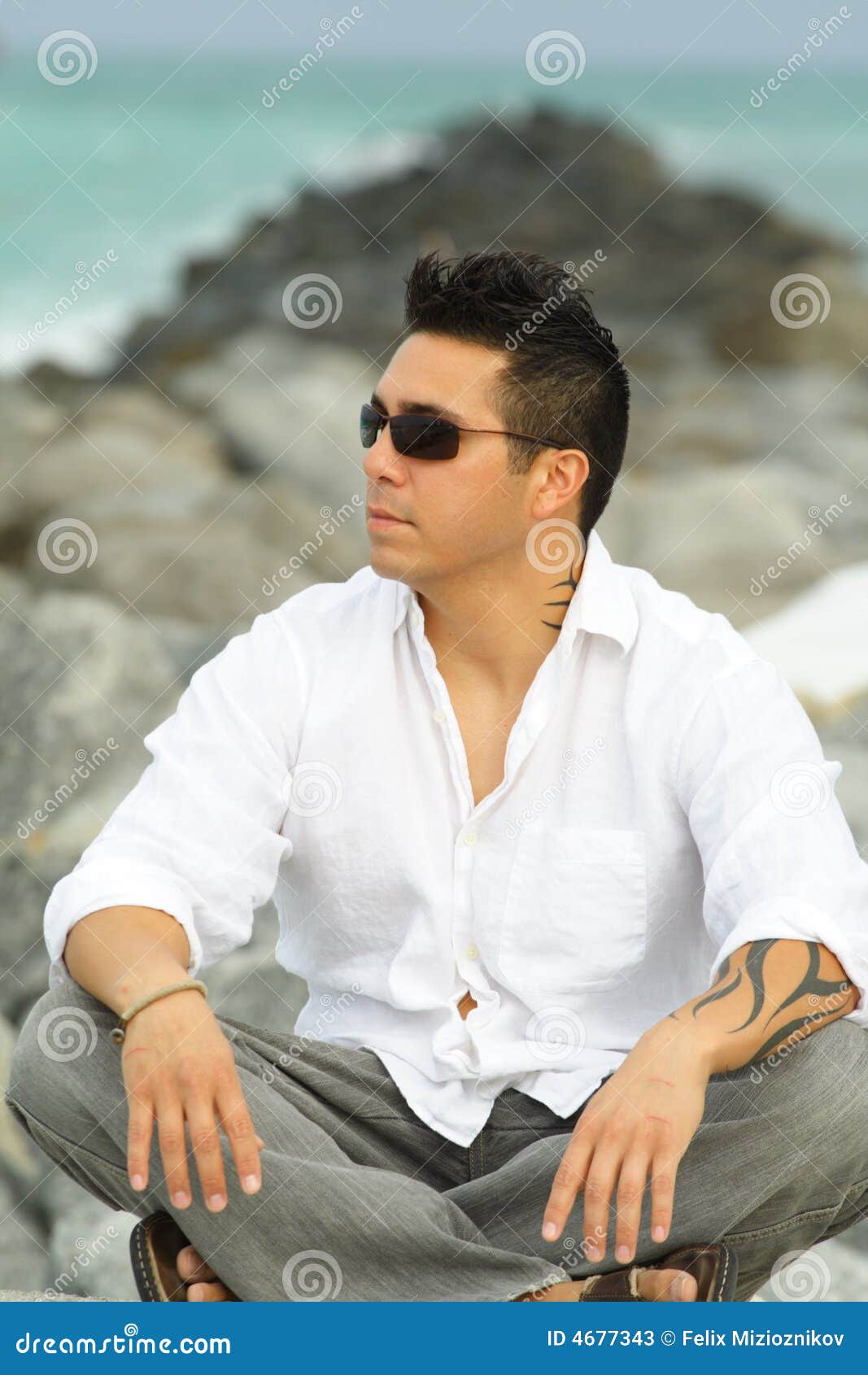 Cool Guy on the Rocks stock image. Image of legs, attractive - 4677343