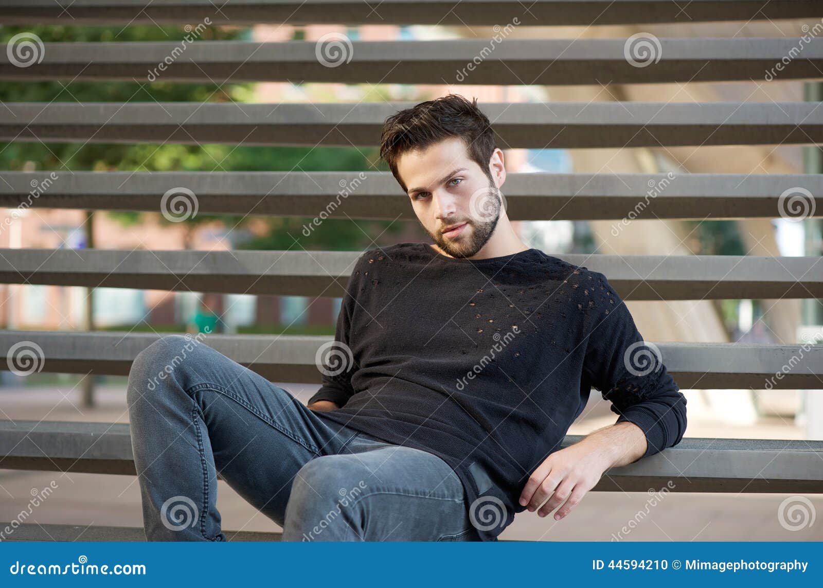 Cool Guy Sitting on Steps Outdoors Stock Photo - Image of background ...