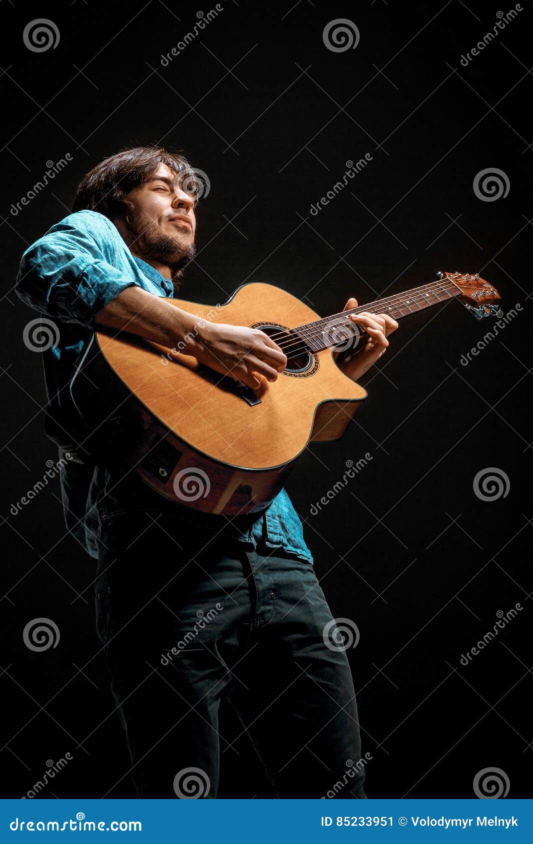 Cool Guy Standing with Guitar on Dark Background Stock Image - Image of ...