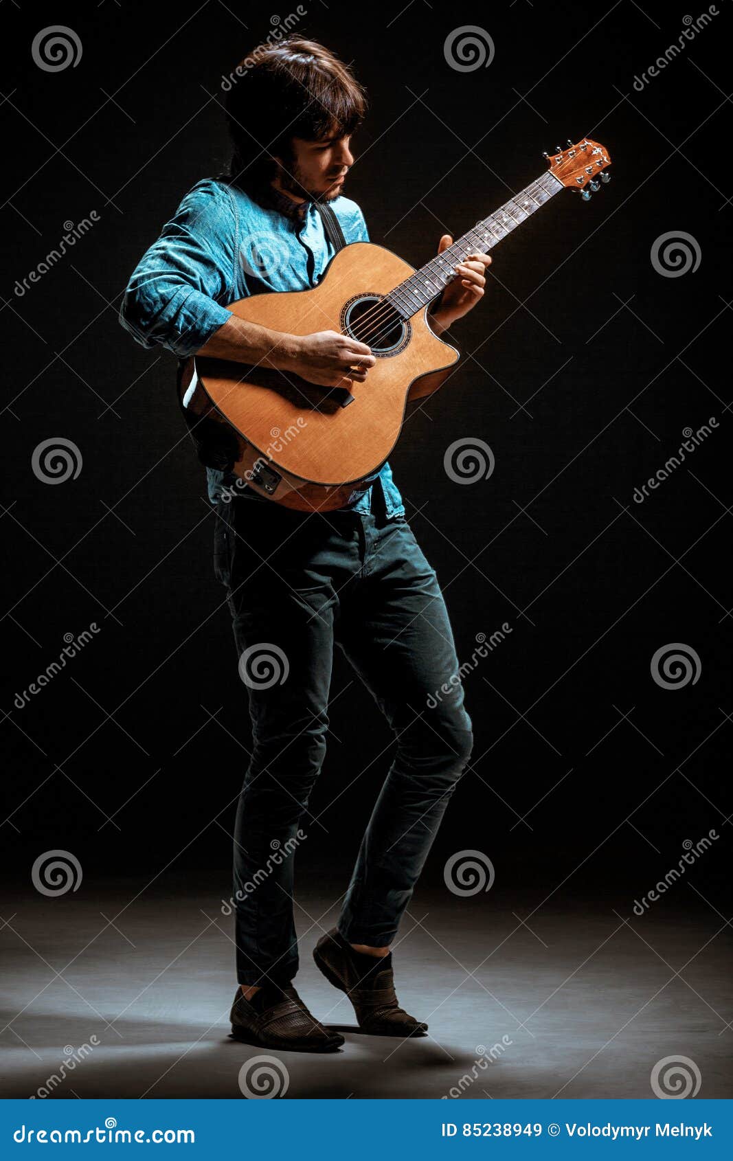 Cool Guy Standing with Guitar on Dark Background Stock Image - Image of ...