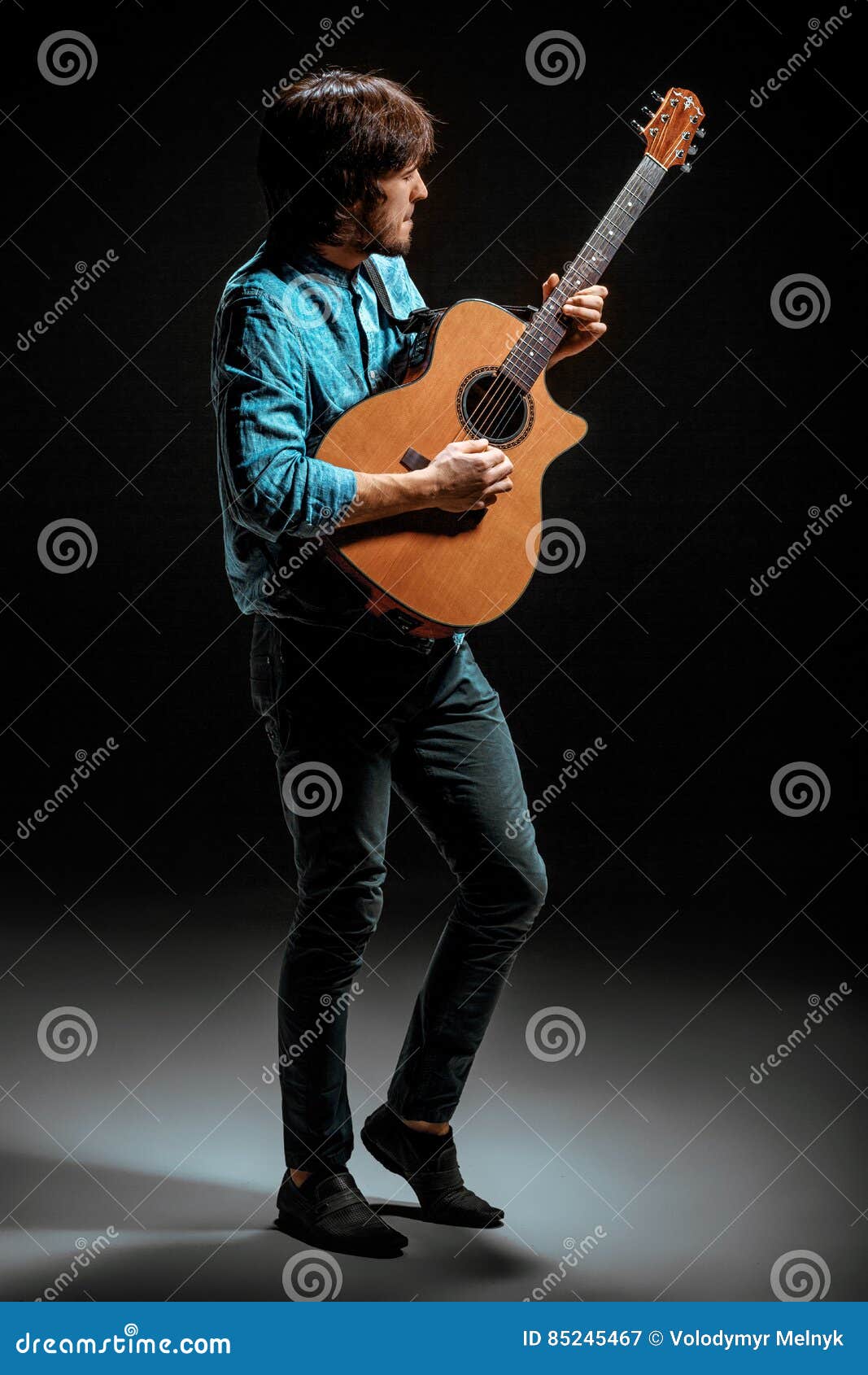 Cool Guy Standing with Guitar on Dark Background Stock Image - Image of ...