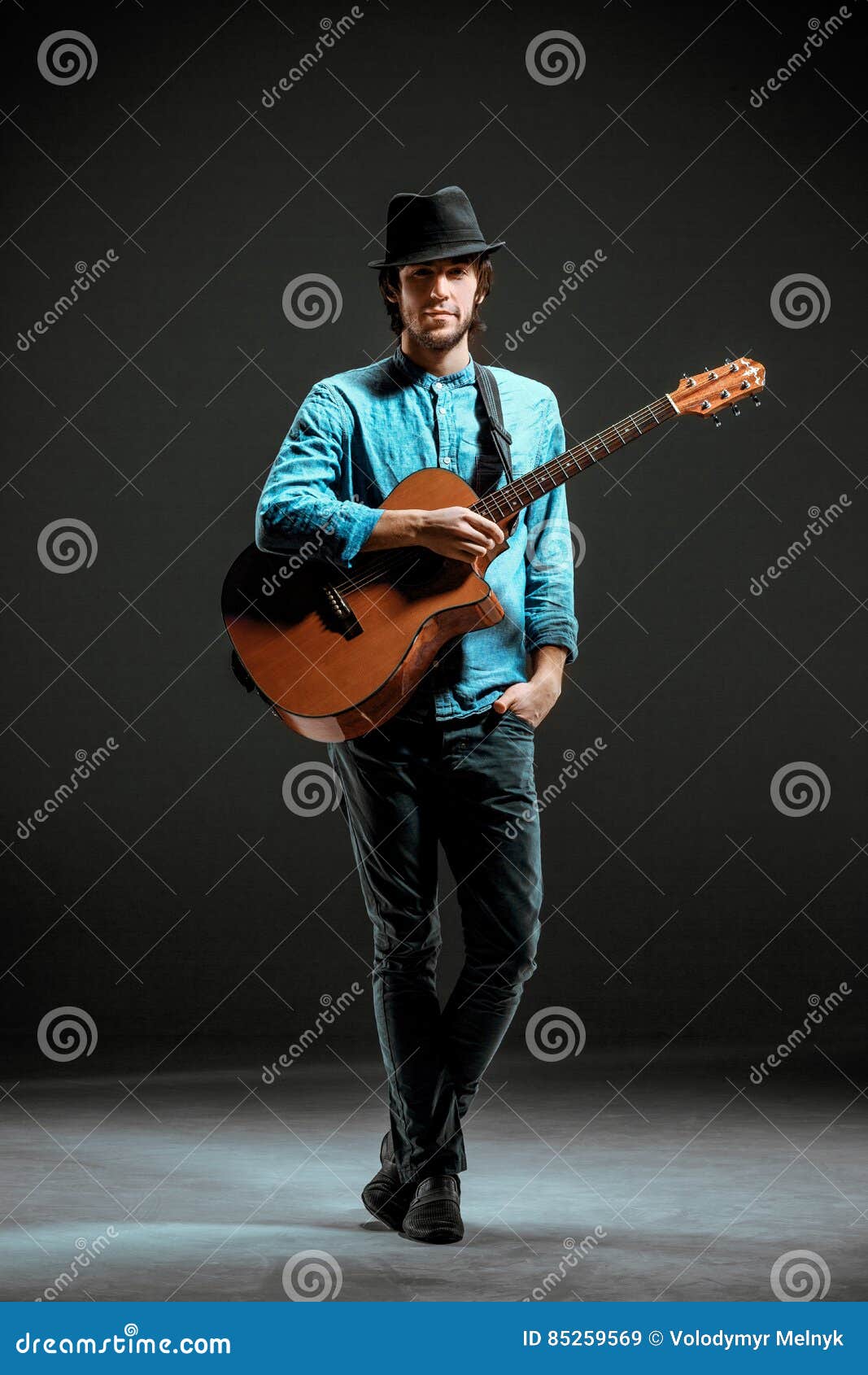 Cool Guy Standing with Guitar on Dark Background Stock Image - Image of ...