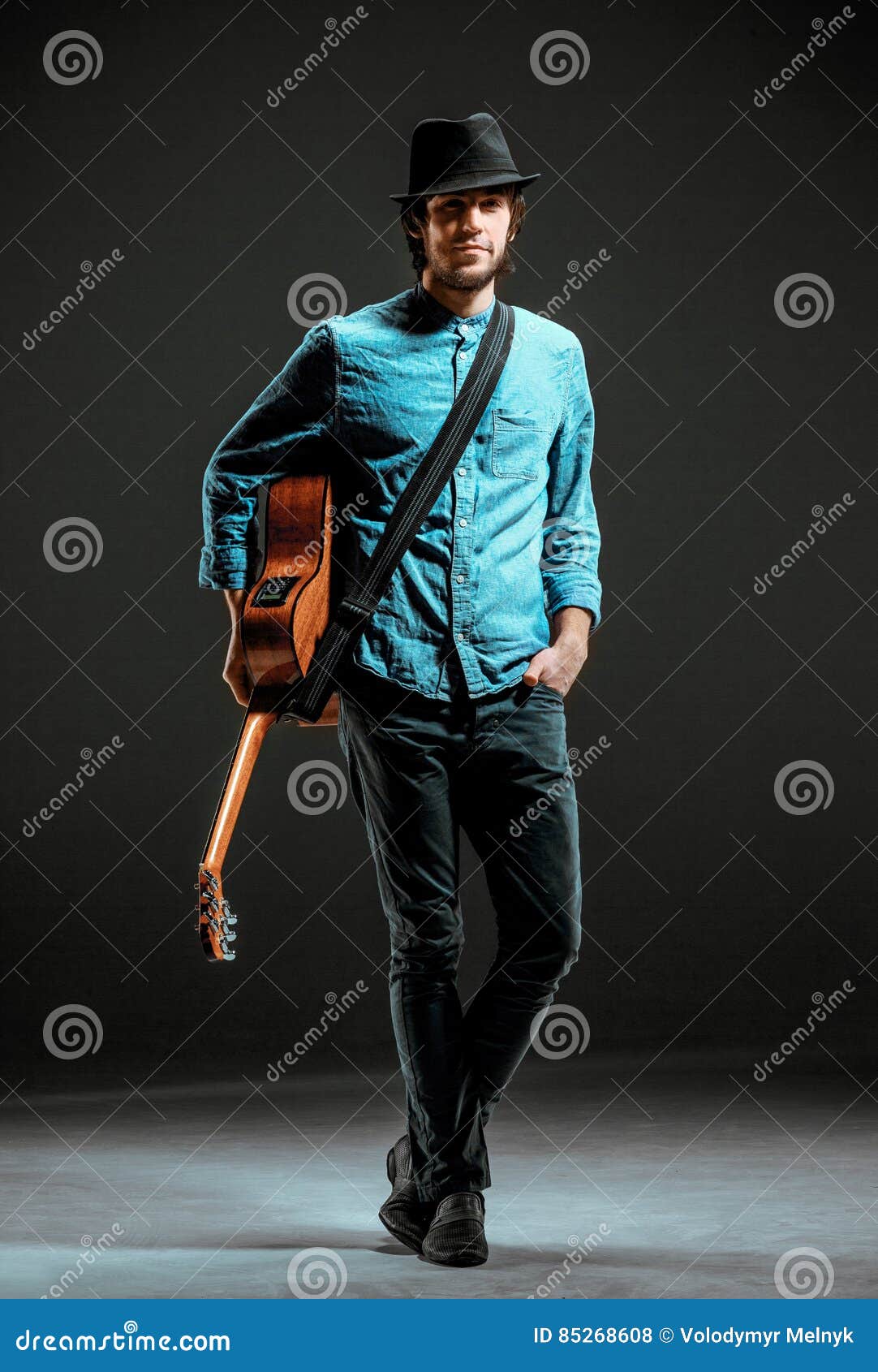 Cool Guy Standing with Guitar on Dark Background Stock Photo - Image of ...