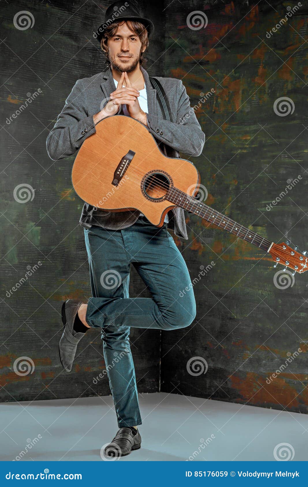Cool Guy Standing with Guitar on Gray Background Stock Image - Image of ...