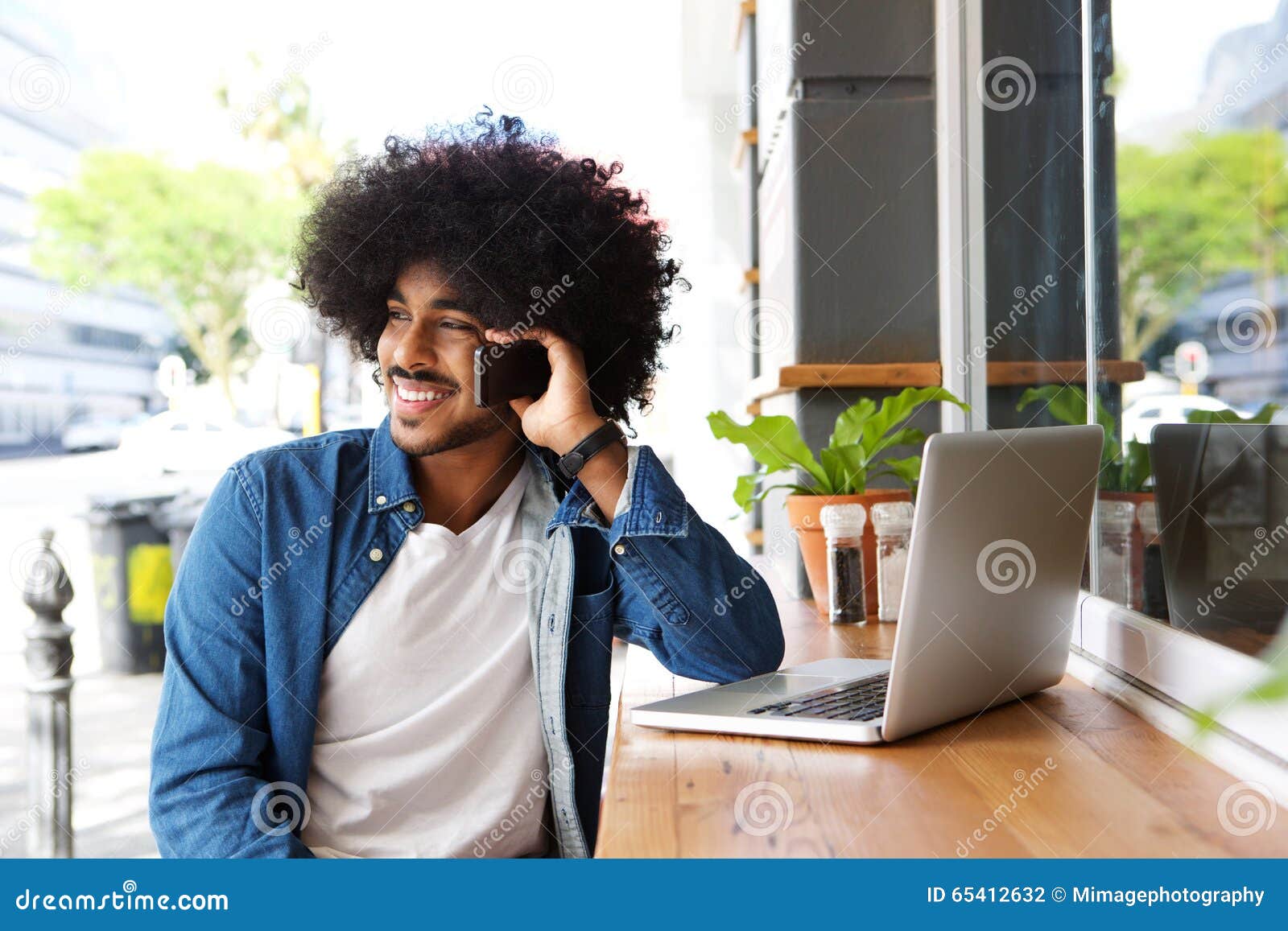 Cool Guy Using Mobile Phone and Laptop Stock Photo - Image of beard ...
