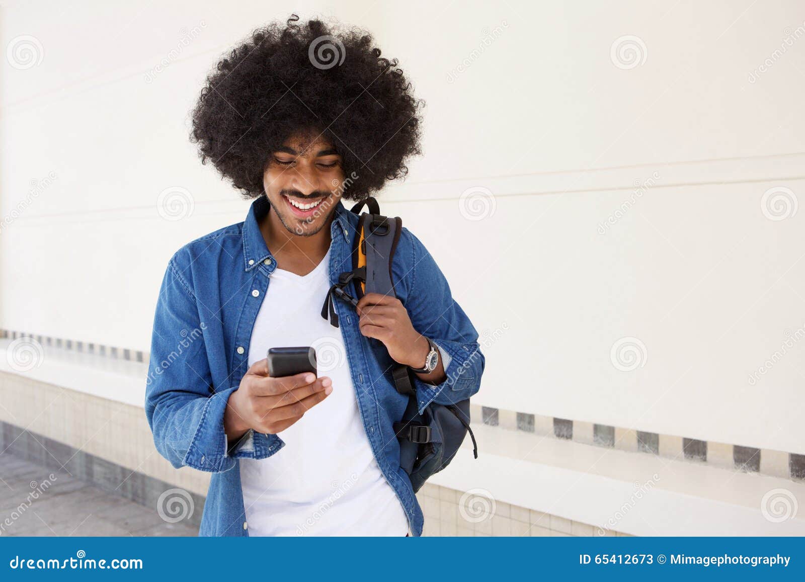 Cool Guy Walking with Mobile Phone and Bag Stock Image - Image of adult ...