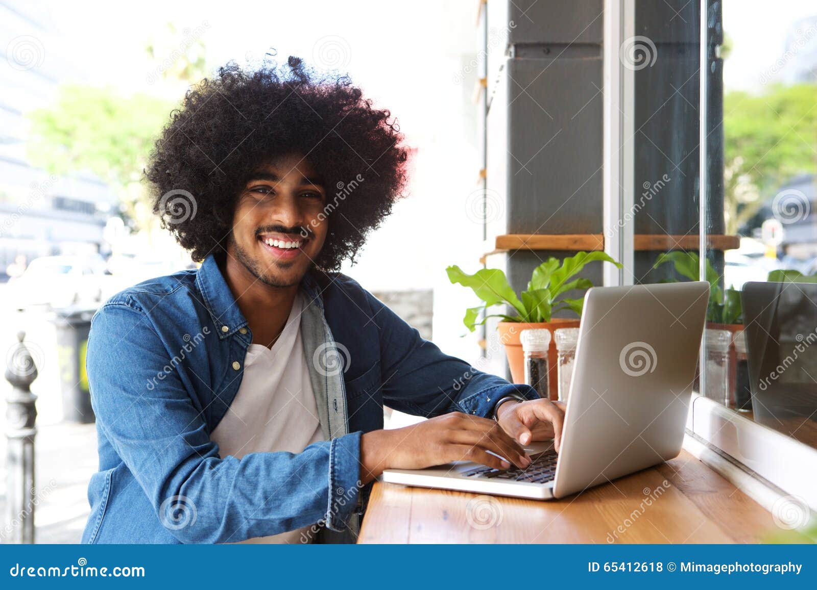Cool Guy Working with Laptop Stock Photo - Image of happiness, light ...
