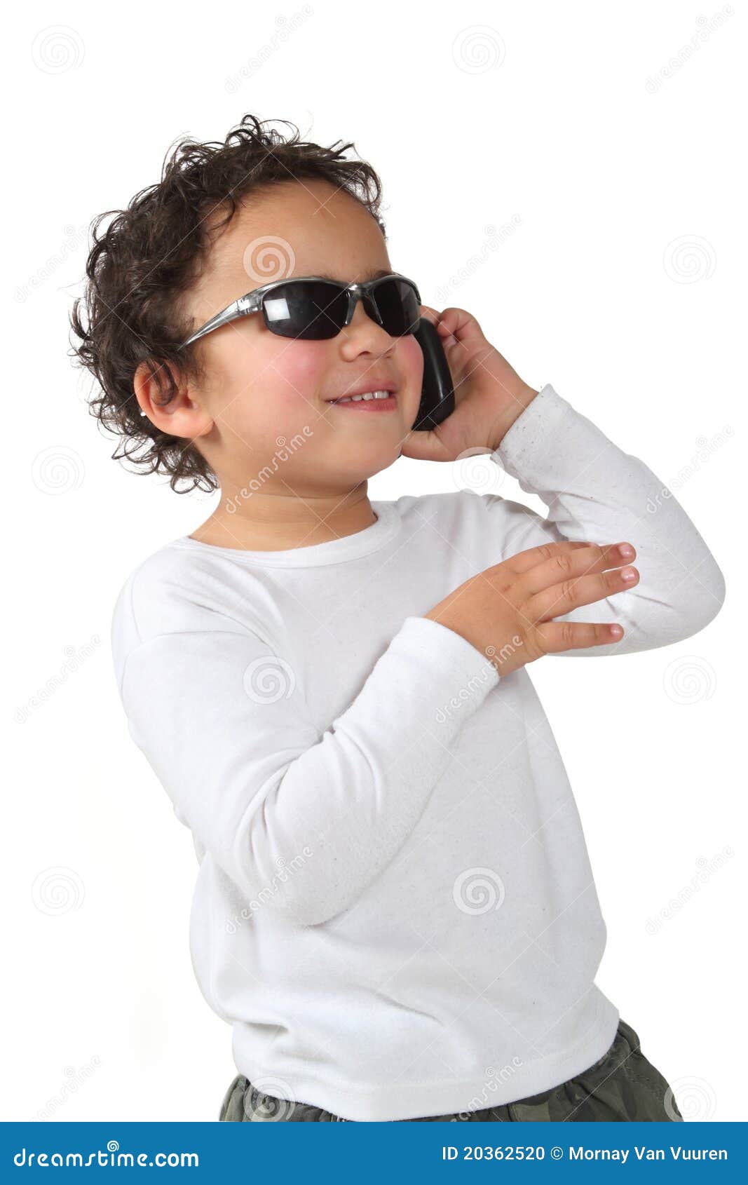 Cool kid on a cell phone stock photo. Image of child - 20362520