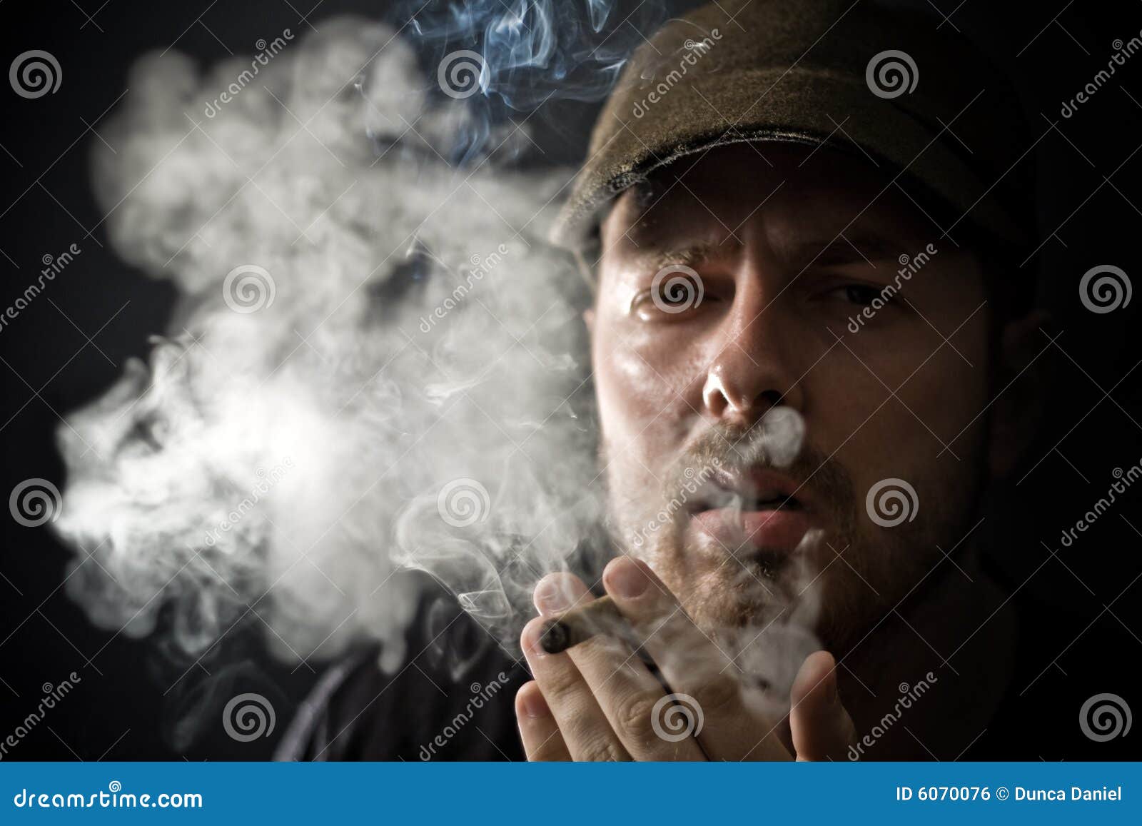 Cool Looking Man Smoking a Cigar Stock Photo - Image of marijuana ...