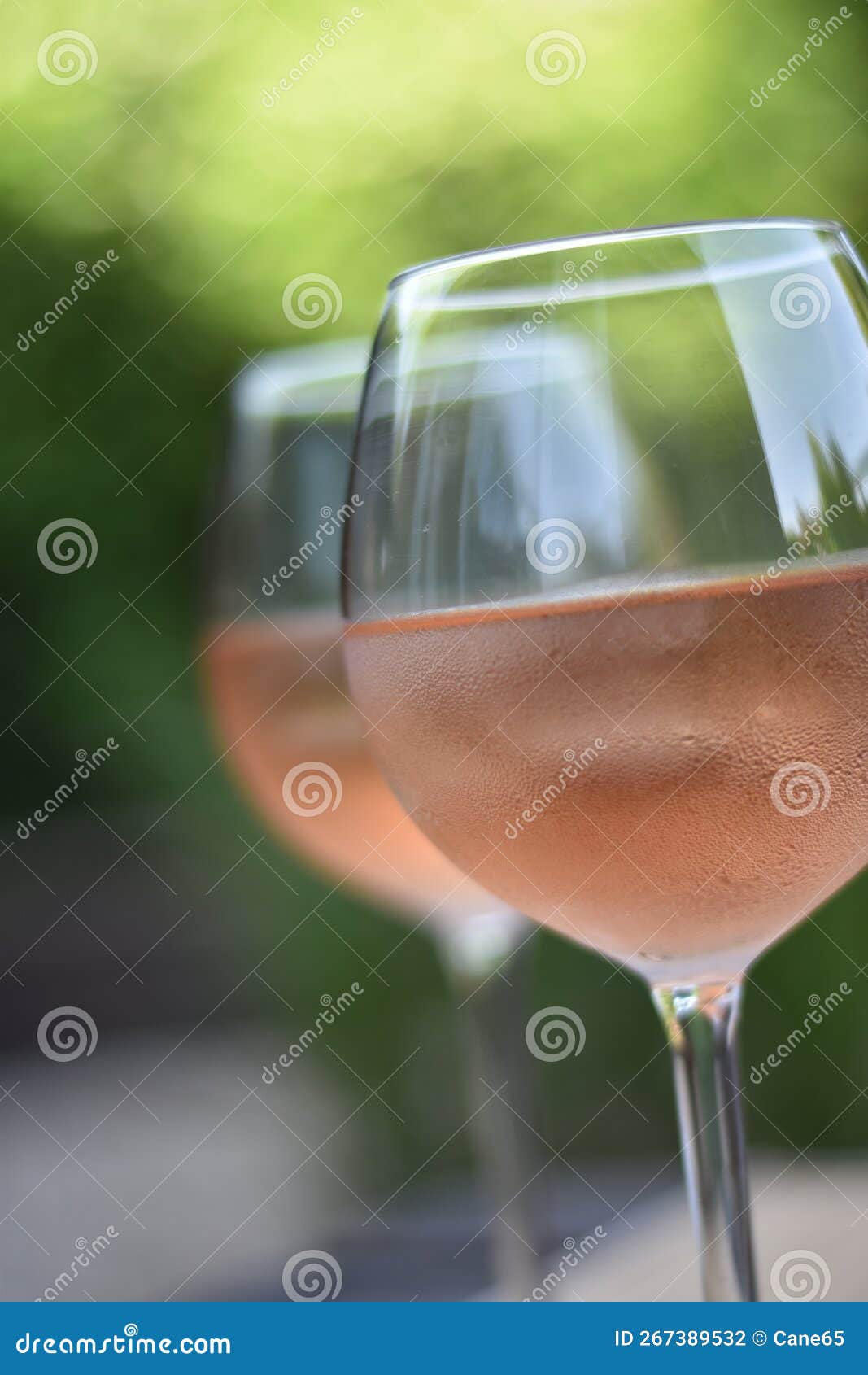 Glasses of Rose Wine on the Table Stock Photo - Image of water ...