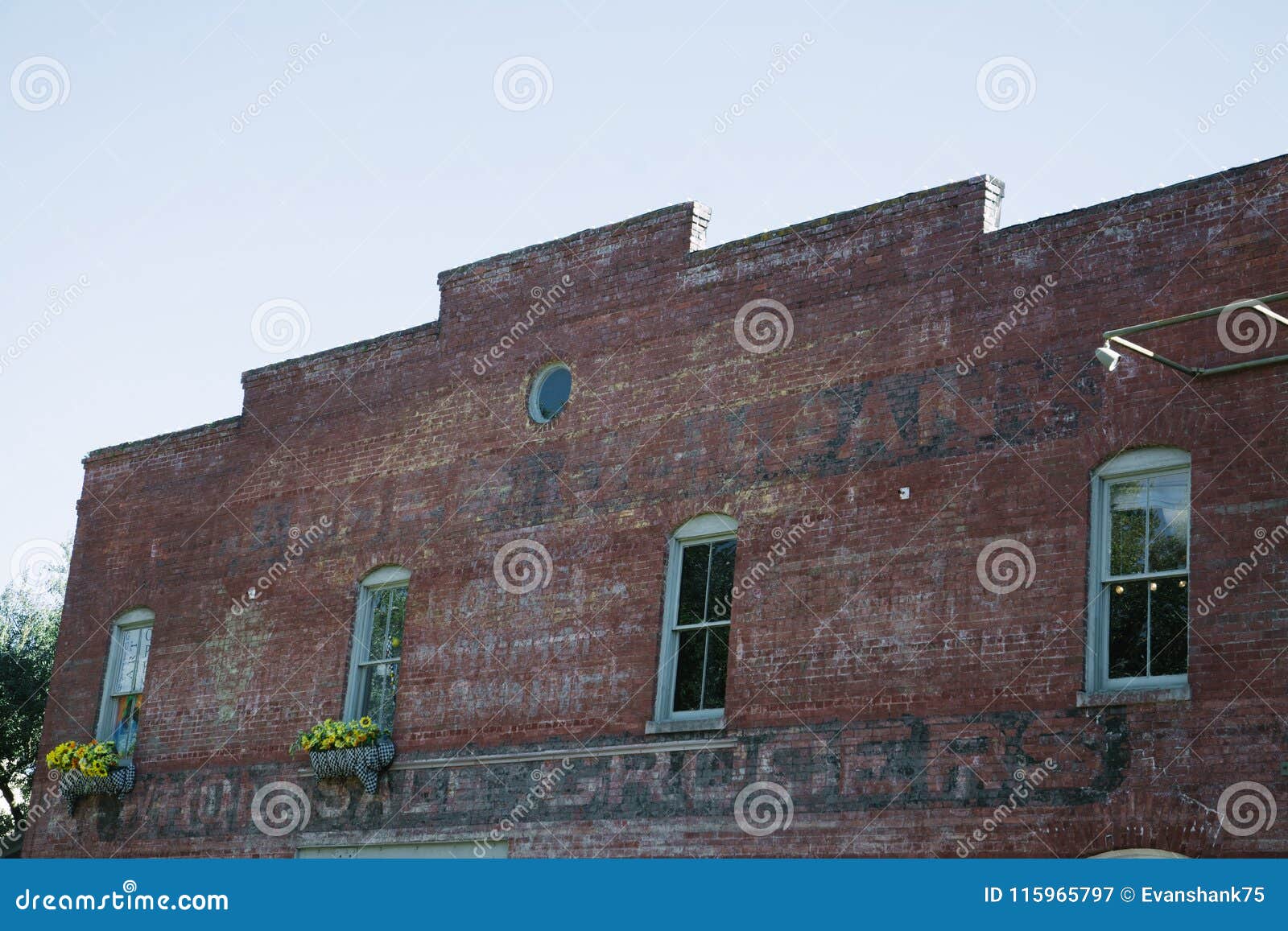 Cool Rustic Brick Building with Symmetrical Windows and Lines Editorial ...
