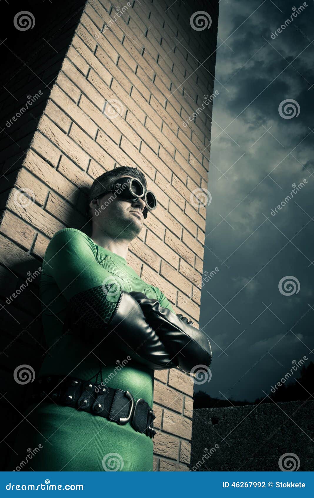 Cool Superhero Leaning To a Brick Wall Stock Photo - Image of dark ...
