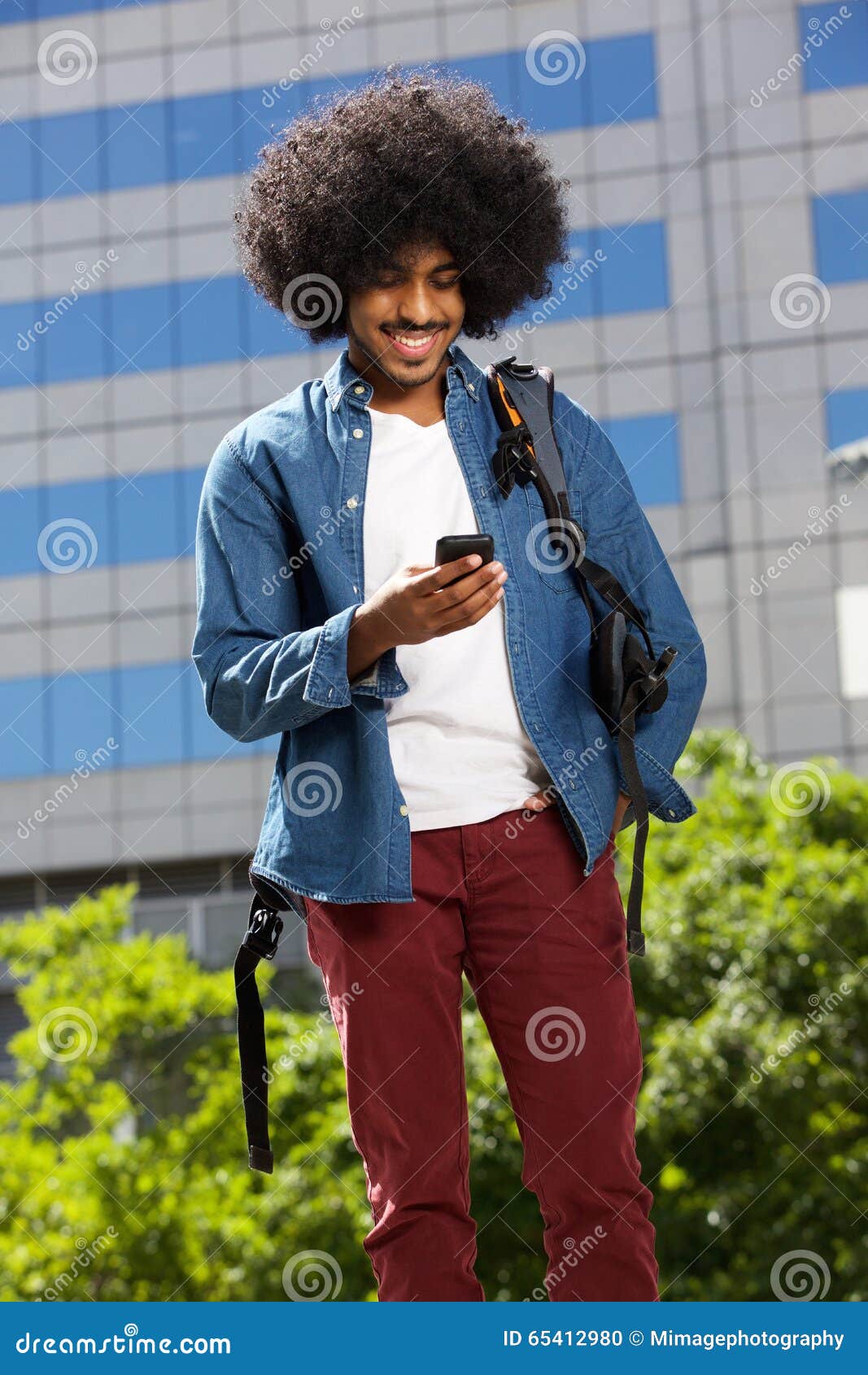 Cool Travel Guy Walking with Mobile Phone Stock Photo - Image of hand ...