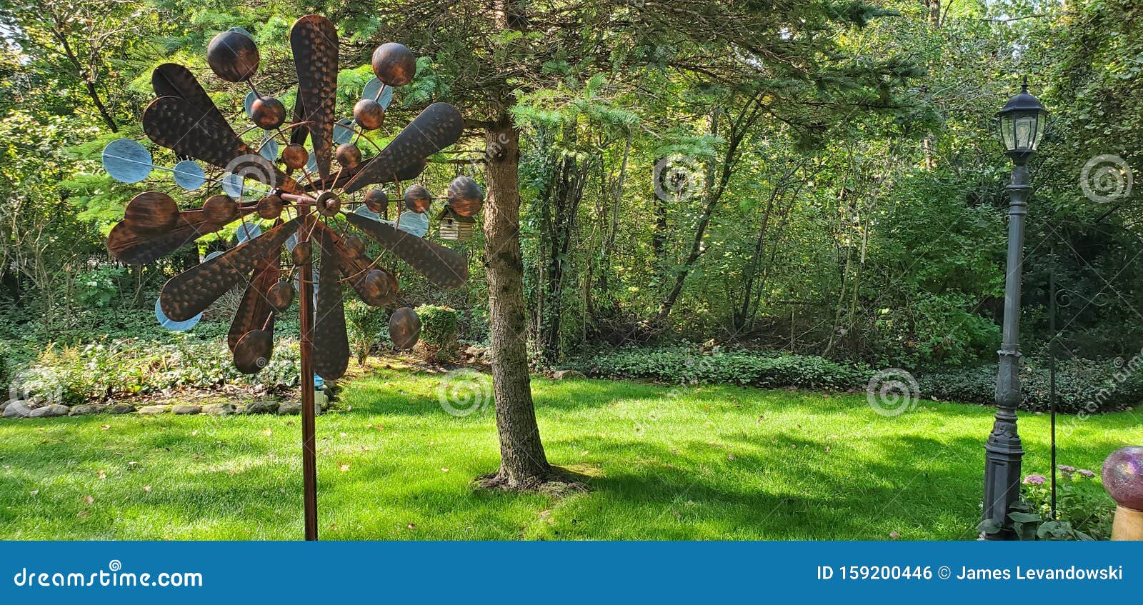 Cool Windmill on stick stock photo. Image of trees, windmill - 159200446