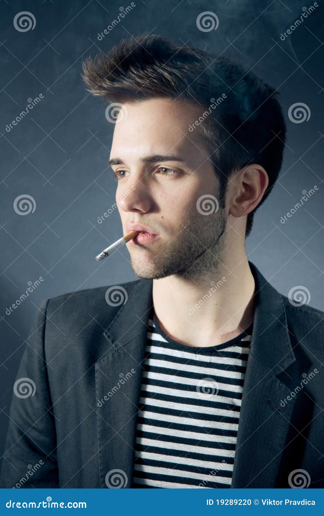 Cool Young Guy Smoking Stock Photo - Image: 19289220
