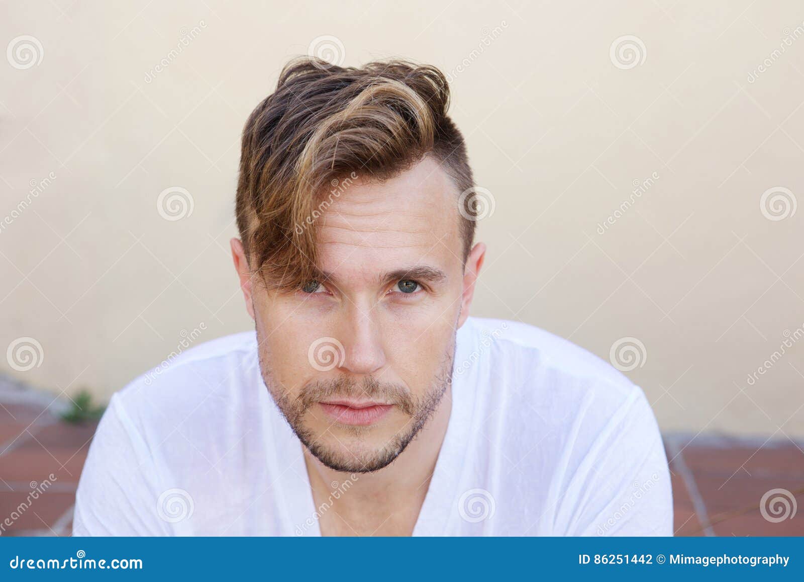 Cool young guy staring stock photo. Image of beard, portrait - 86251442