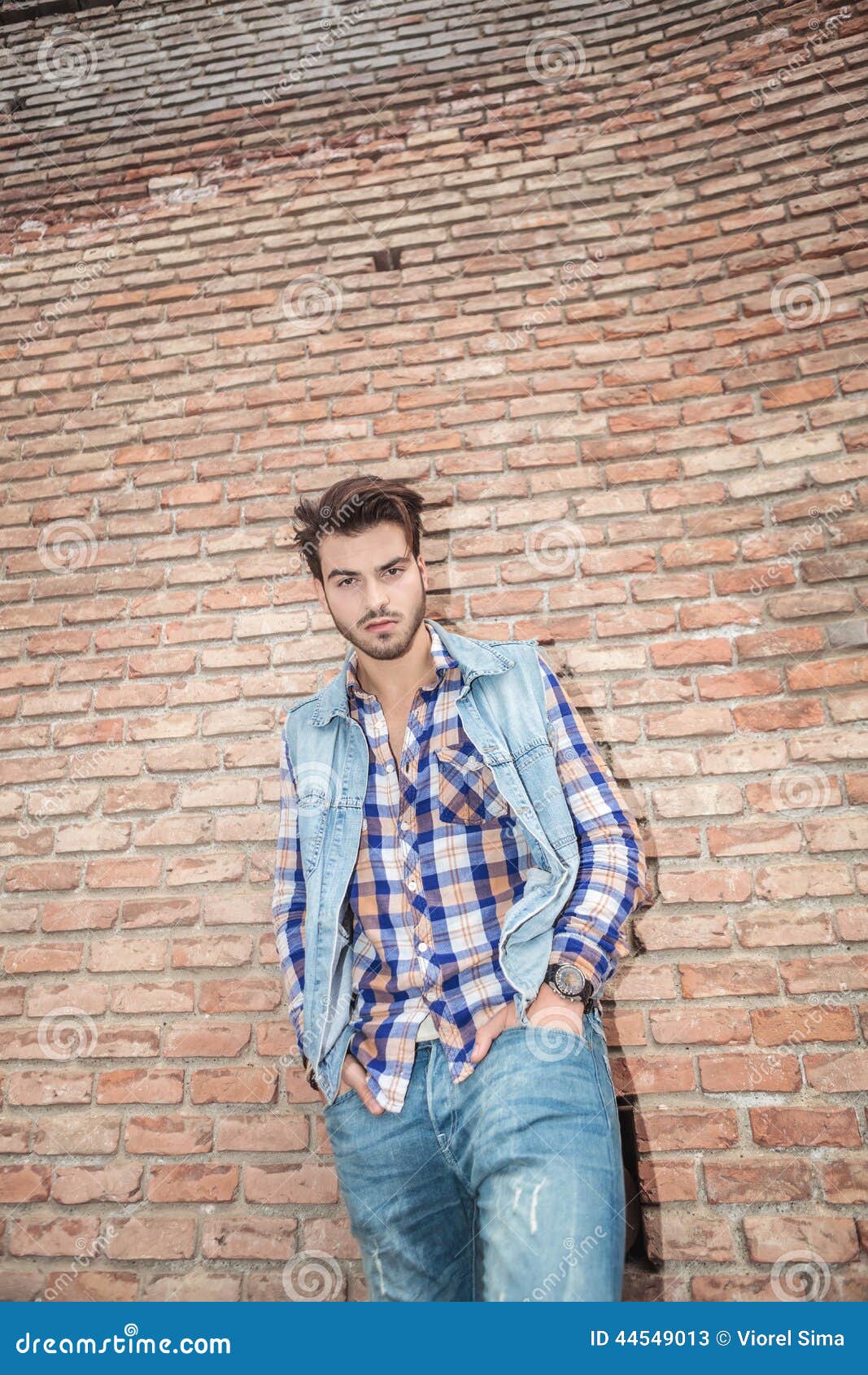 Cool Young Man Leaning on a Brick Wall Stock Image - Image of people ...