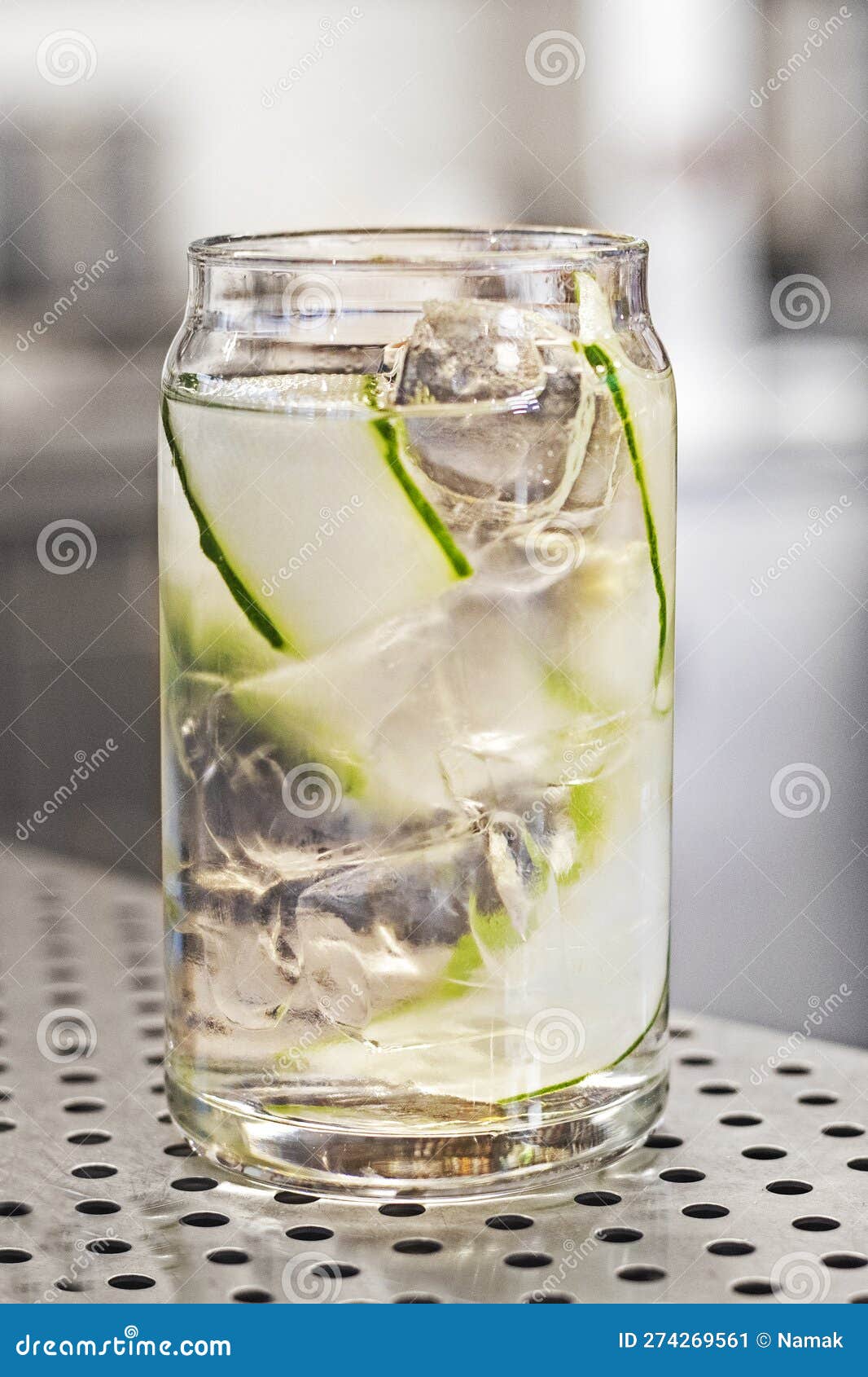 Cooling Cocktail with Cucumber, Sprite and Ice Cubes Stock Image ...