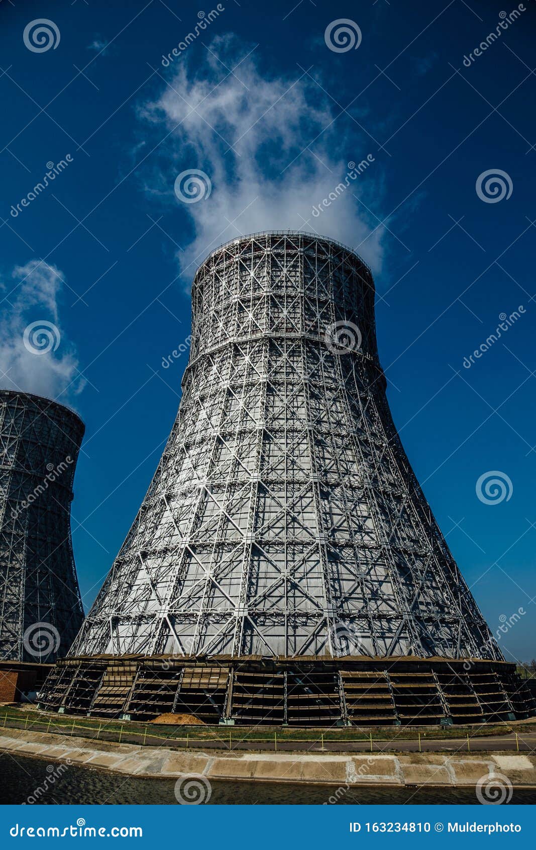 Cooling Tower of Nuclear Power Plant Against Blue Sky Stock Photo ...