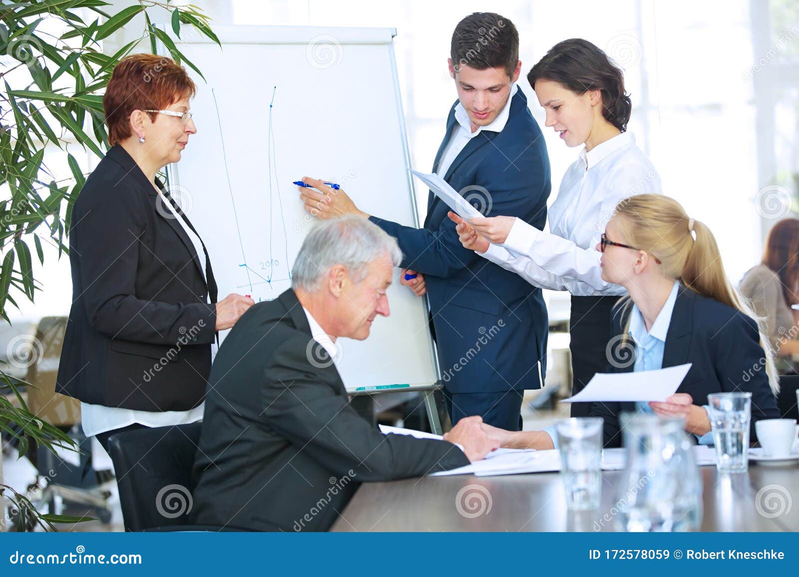 Cooperation in the Business Team at the Meeting Stock Image - Image of ...