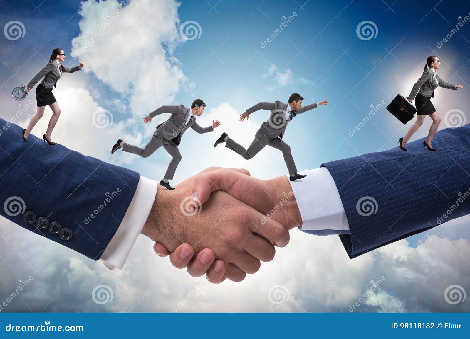 The Cooperation Concept with People Running on Handshake Stock Photo ...
