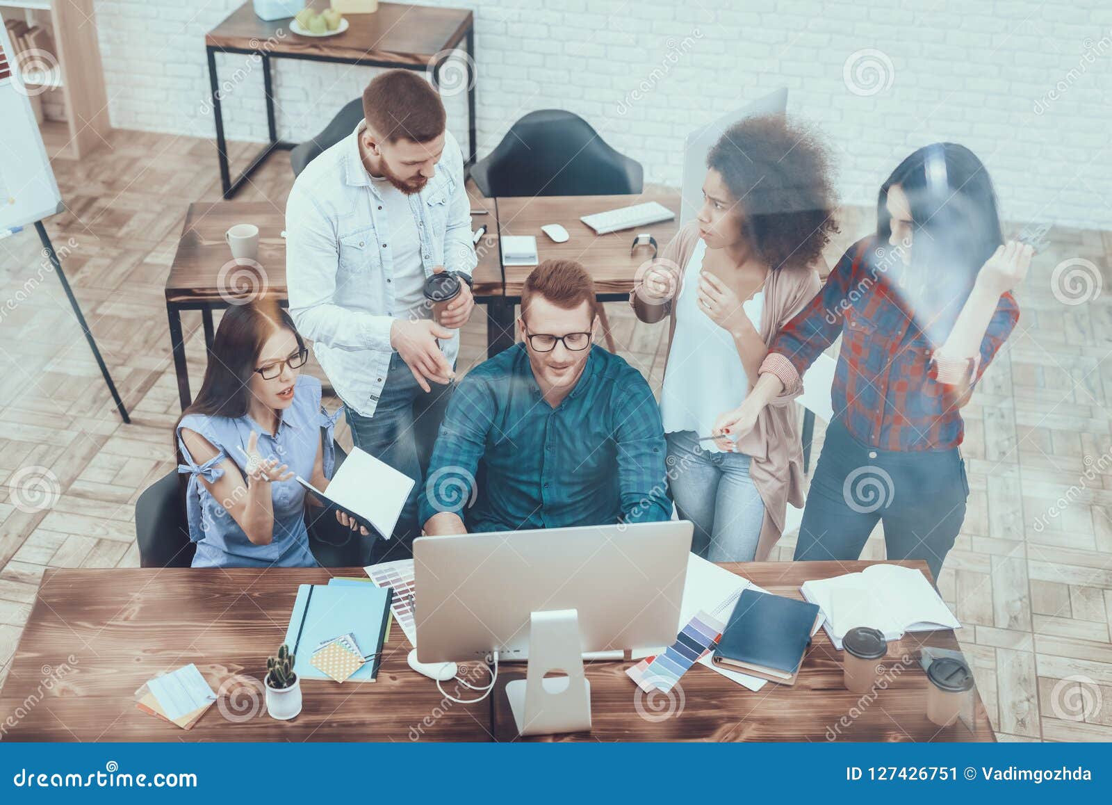 Cooperation. Group. Young. Large Bright Office. Stock Image - Image of ...