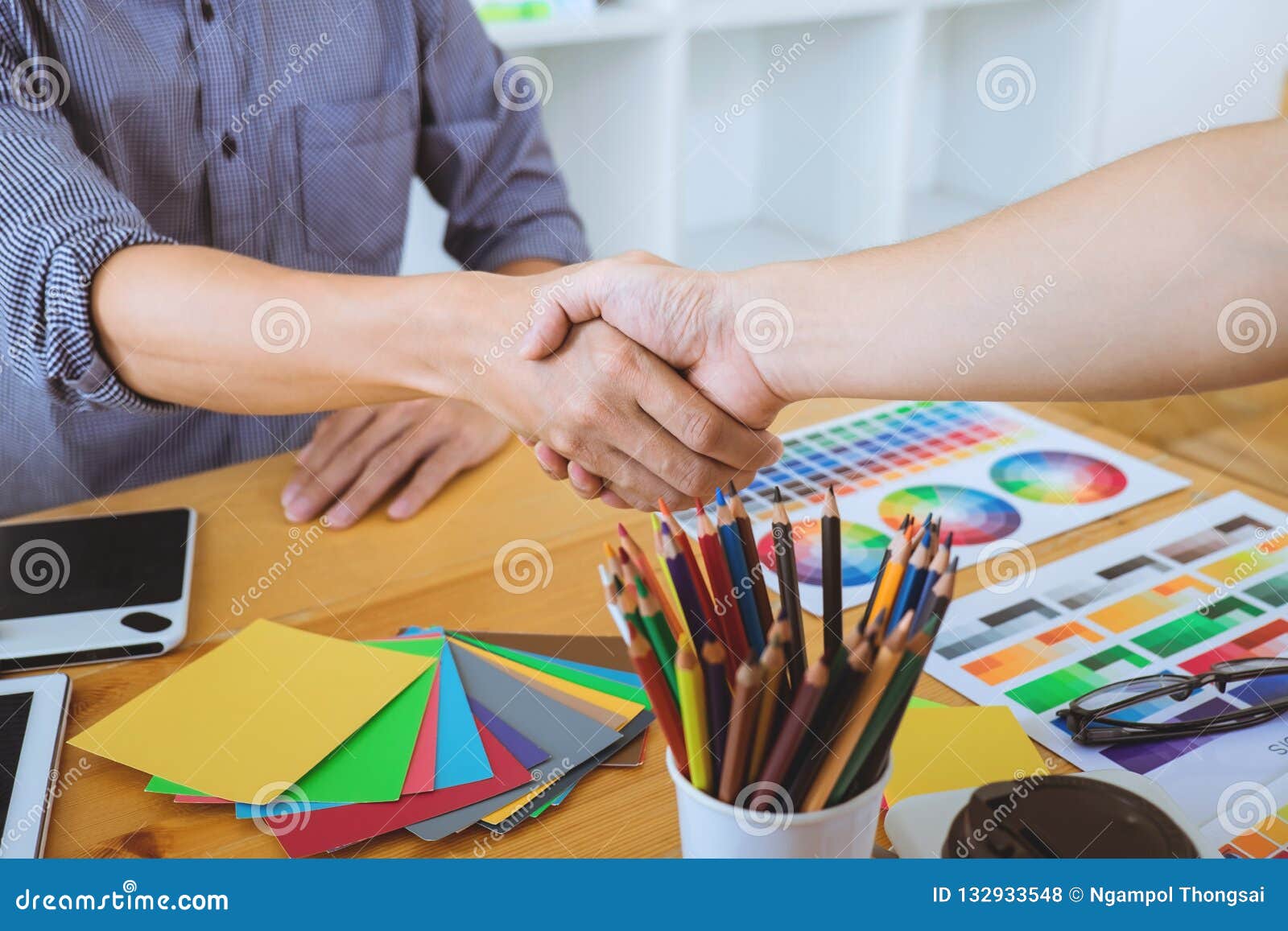 Cooperation of Young Creative Graphic Designer Working on Workspace and ...