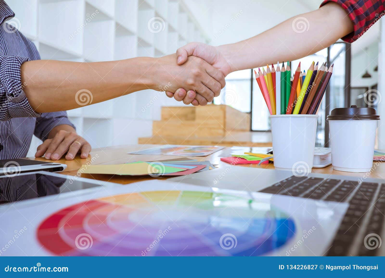 Cooperation of Young Creative Graphic Designer Working on Workspace and ...