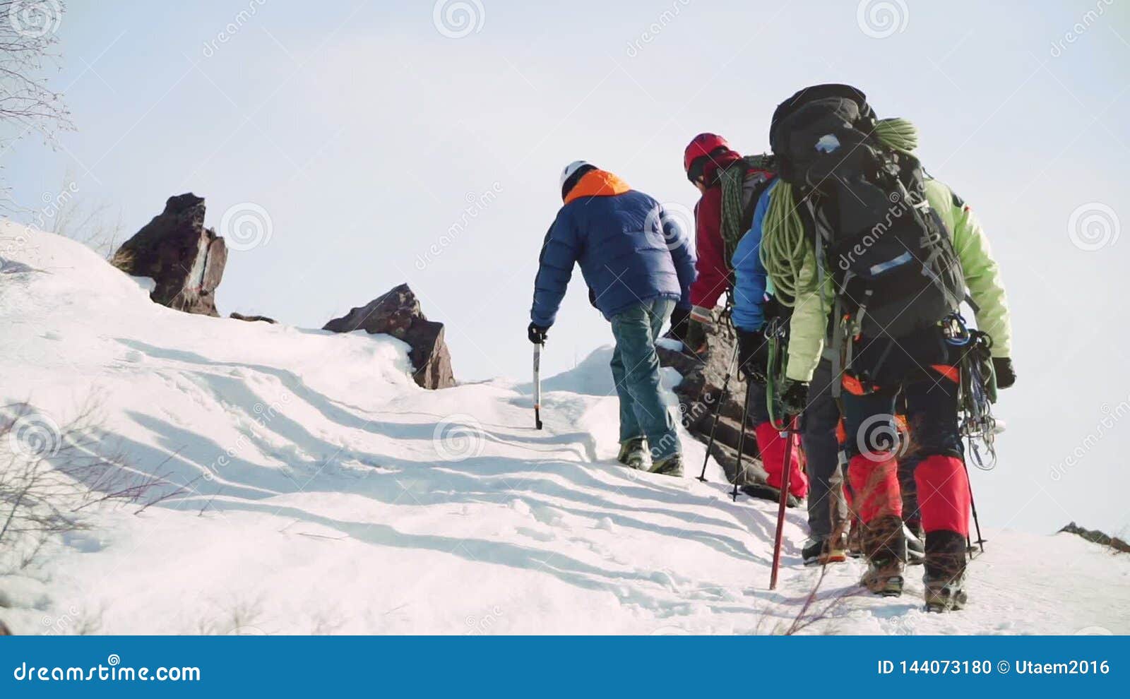 Coordinated a Group of Climbers Climb the Steep Snow Slope of the ...