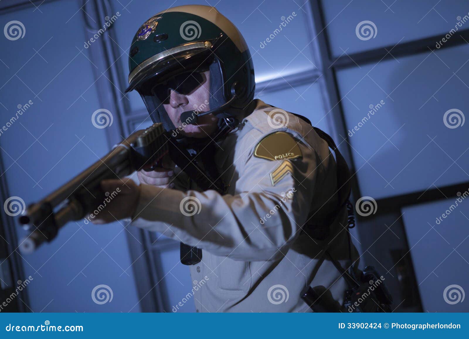 Cop Aiming Rifle Against Door Stock Photo - Image of door, house: 33902424
