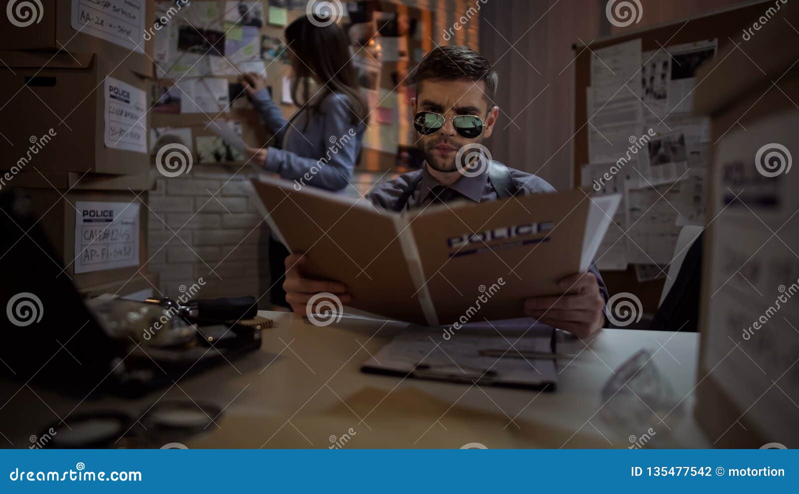 Cop Analyzing Witness Statement Files, Paper Working, Preparing ...