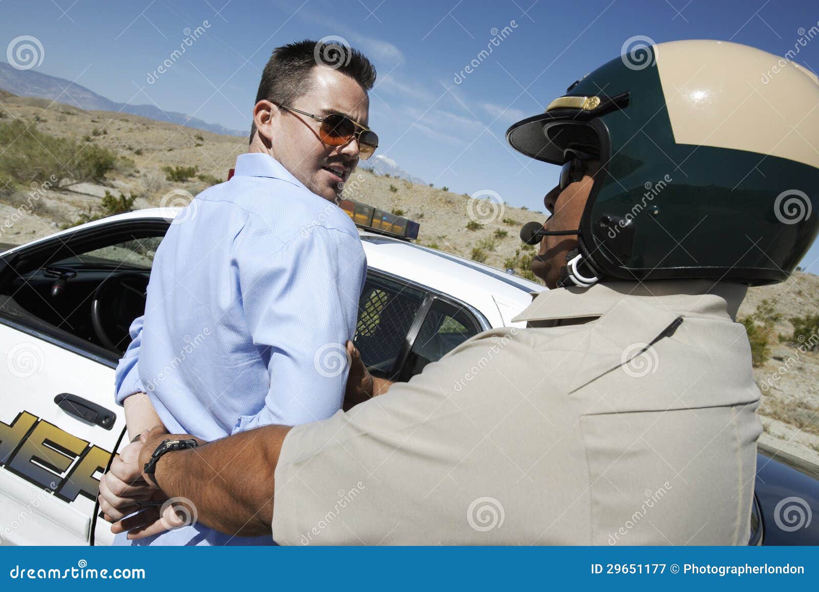 Cop Arresting Middle Aged Man Stock Image - Image of hispanic ...