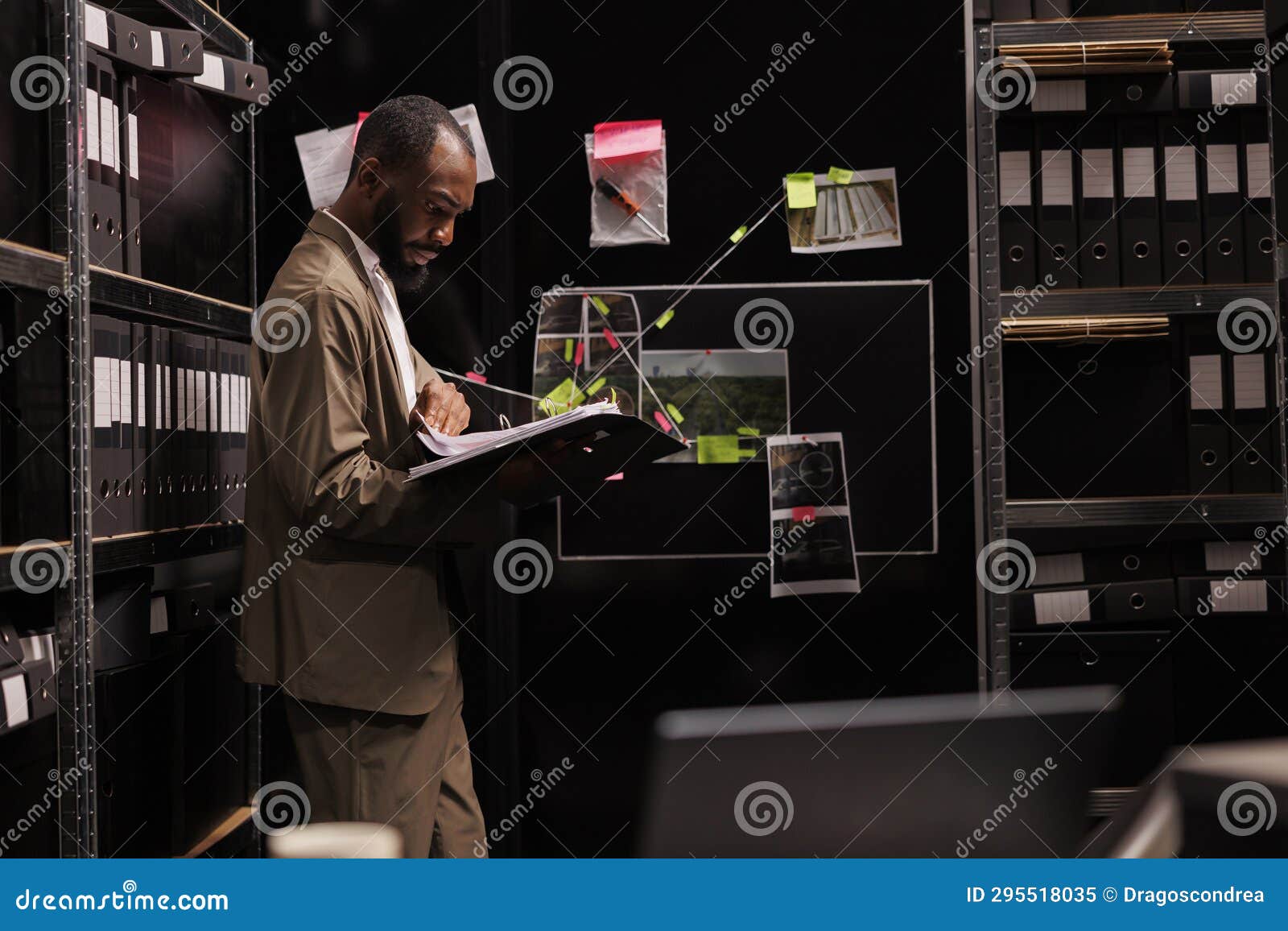 Cop Reading Case File and Studying Detective Board Stock Image - Image ...