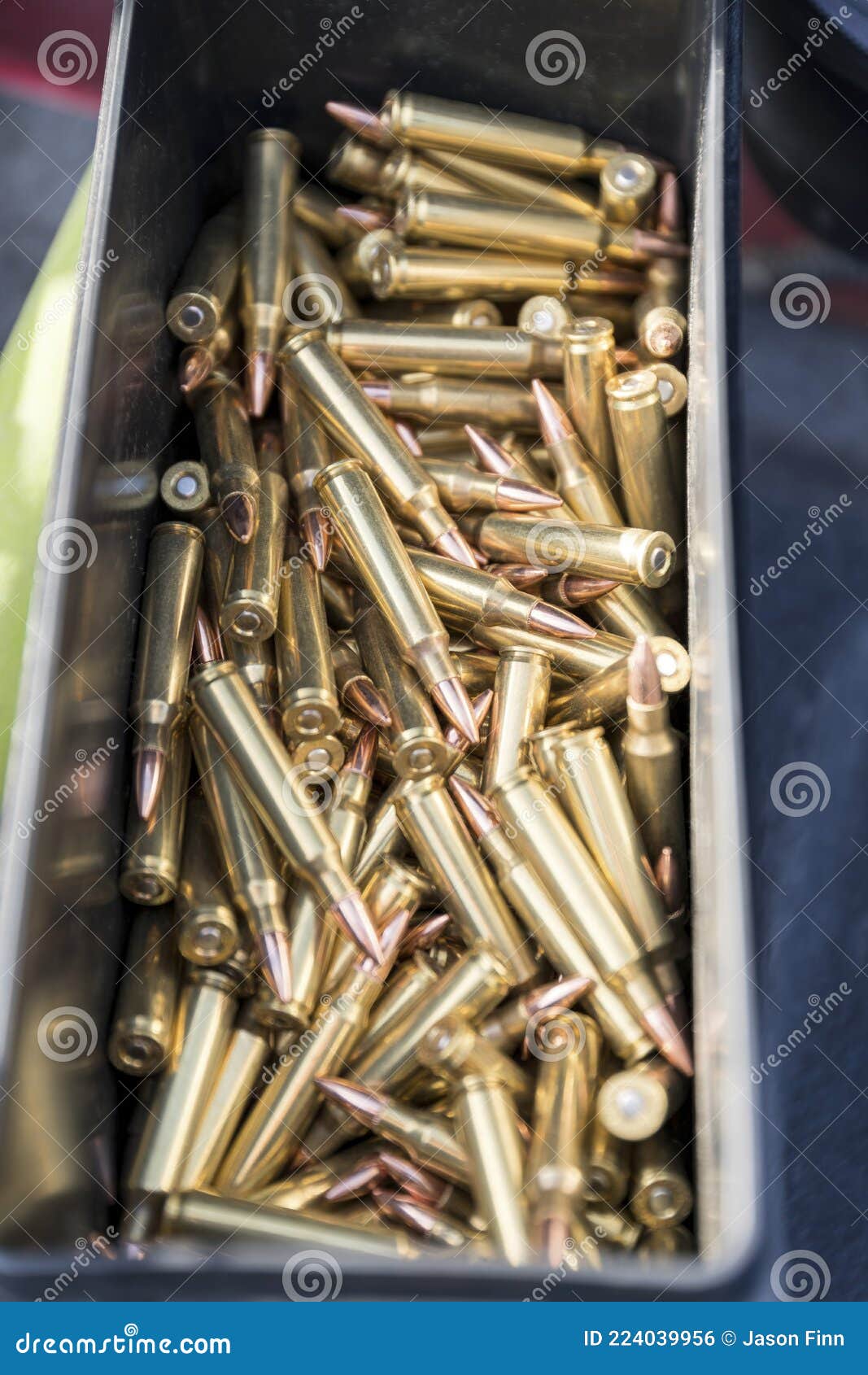 Copper Bullets 223 Ammo of a Rifle Inside a Black Container Stock Photo ...