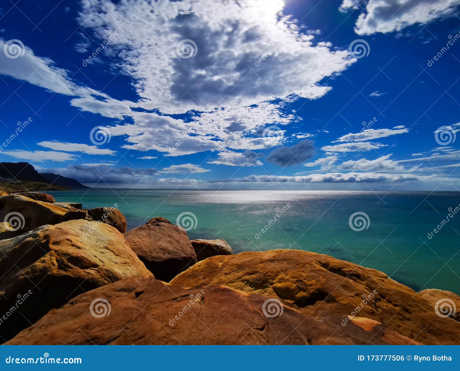 Copper Colored Rocks with Blue Sky Stock Photo - Image of solitude ...