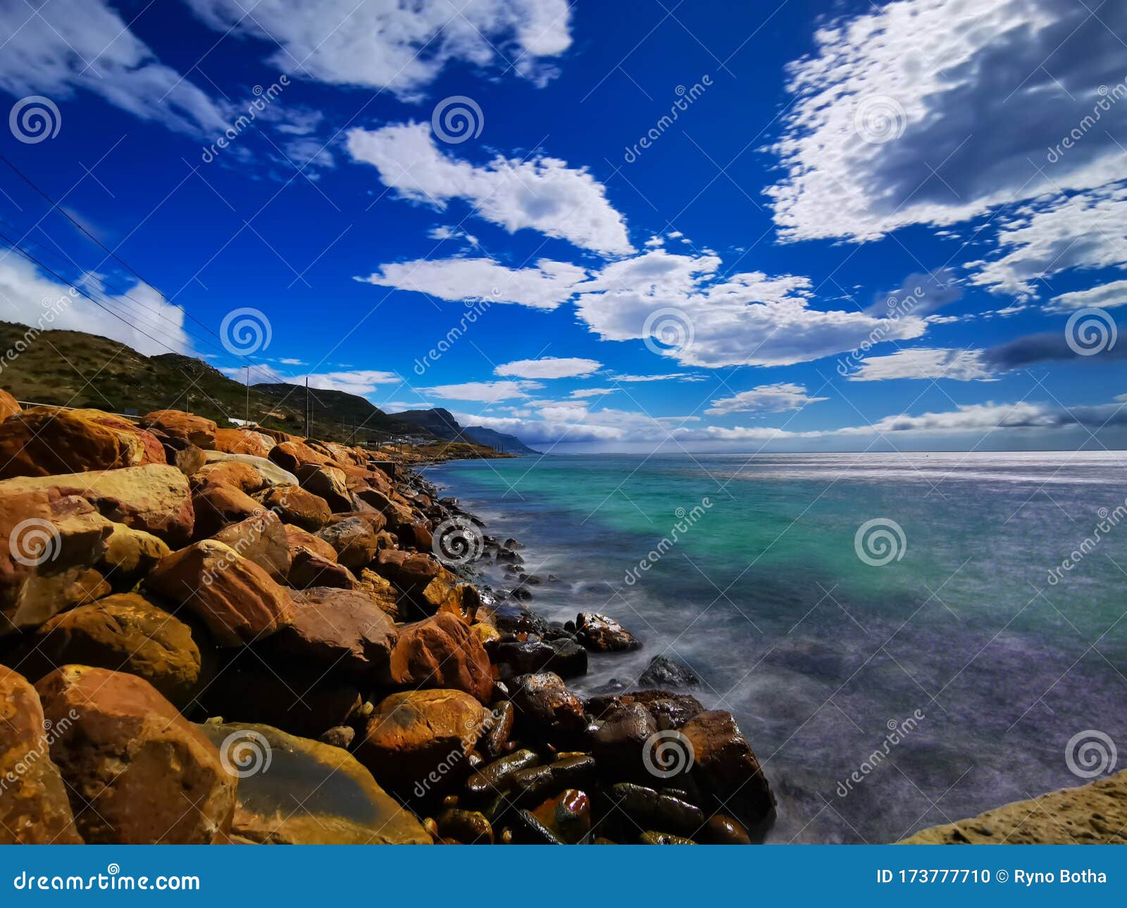 Copper Colored Rocks with Blue Sky Stock Photo - Image of beach, scene ...