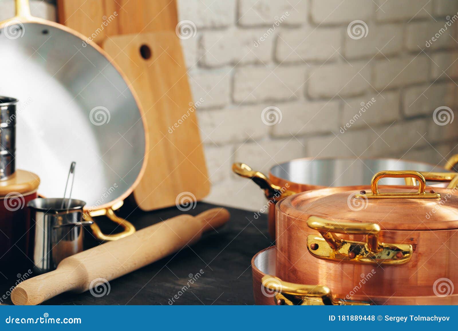 Copper Cookware with Wooden Kitchen Utensils Close Up Stock Photo ...