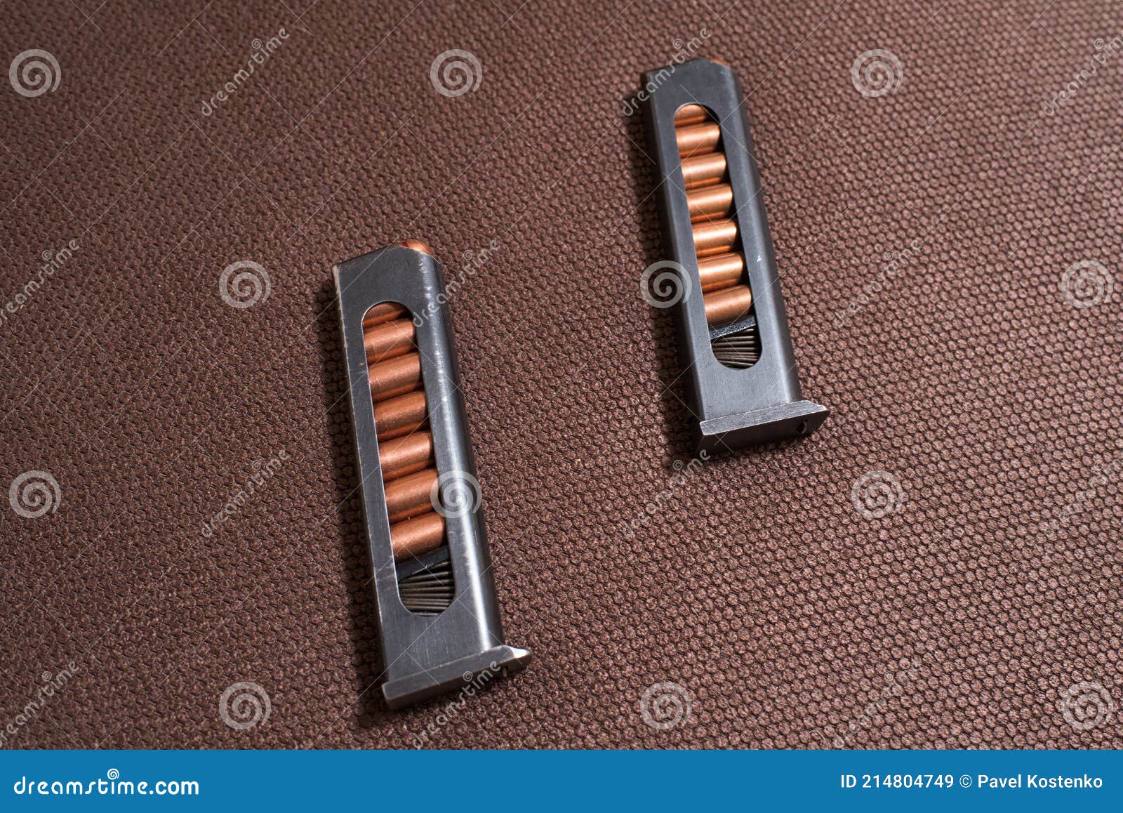 Copper Firearms Bullets and Pistol Clips. Weapon. Stock Image - Image ...