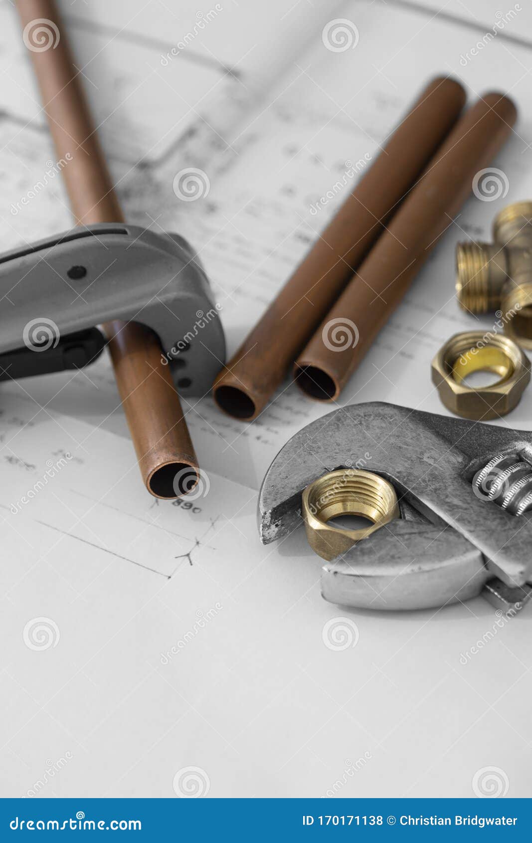 Copper Pipe Cutter and Adjustable Spanner Wrench Tools on a Set of ...