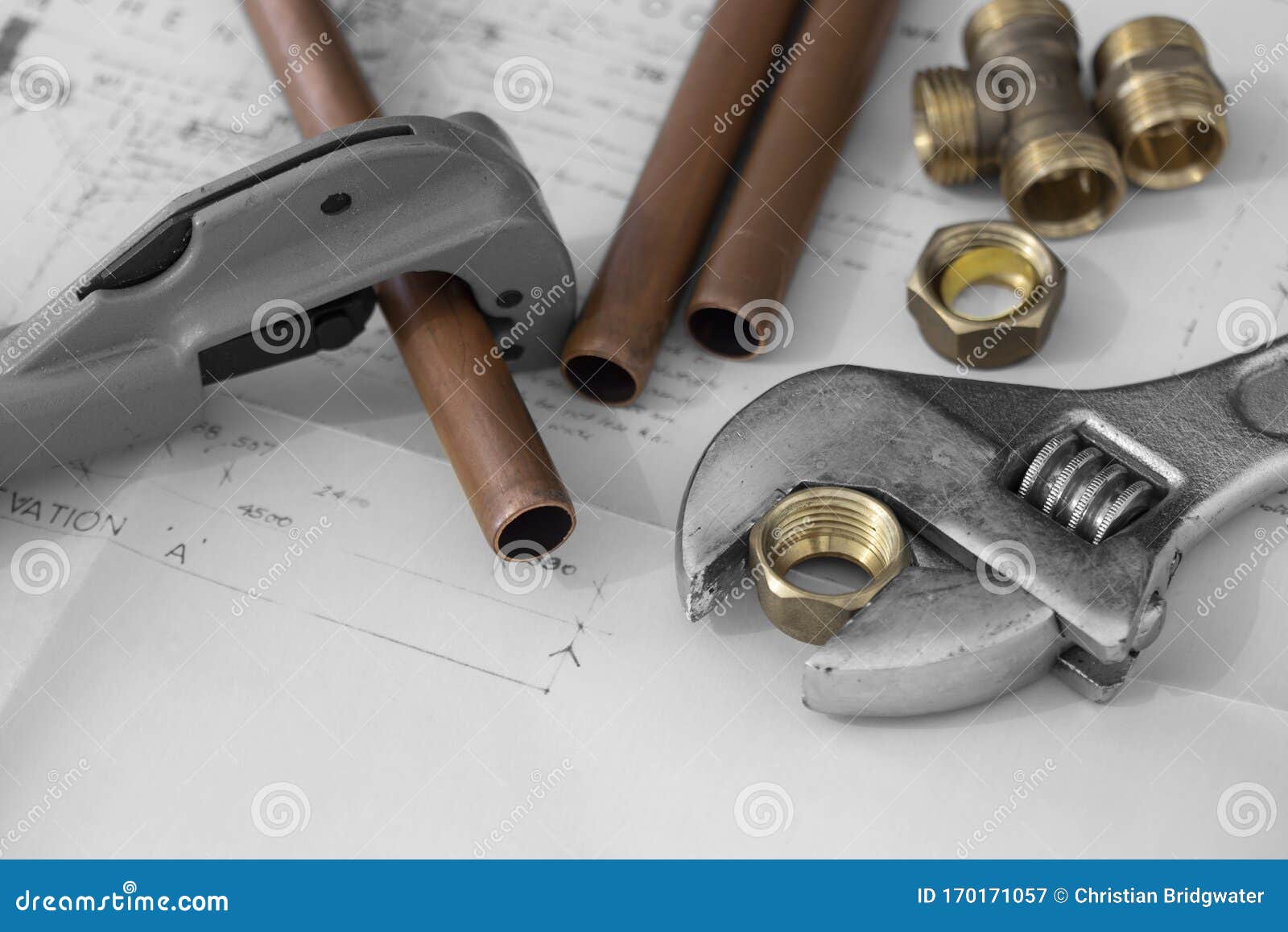 Copper Pipe Cutter and Adjustable Spanner Wrench Tools on a Set of ...