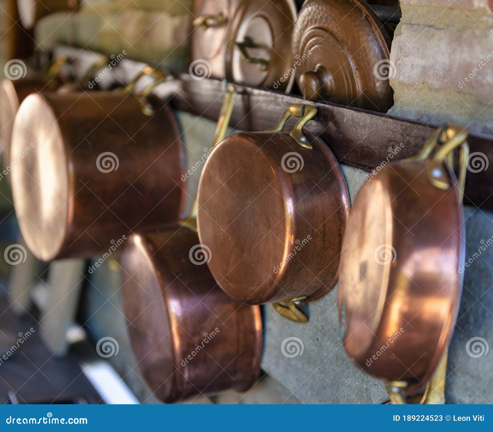 Copper Pot on a Wall in a Garden Stock Image - Image of roasted, rustic ...