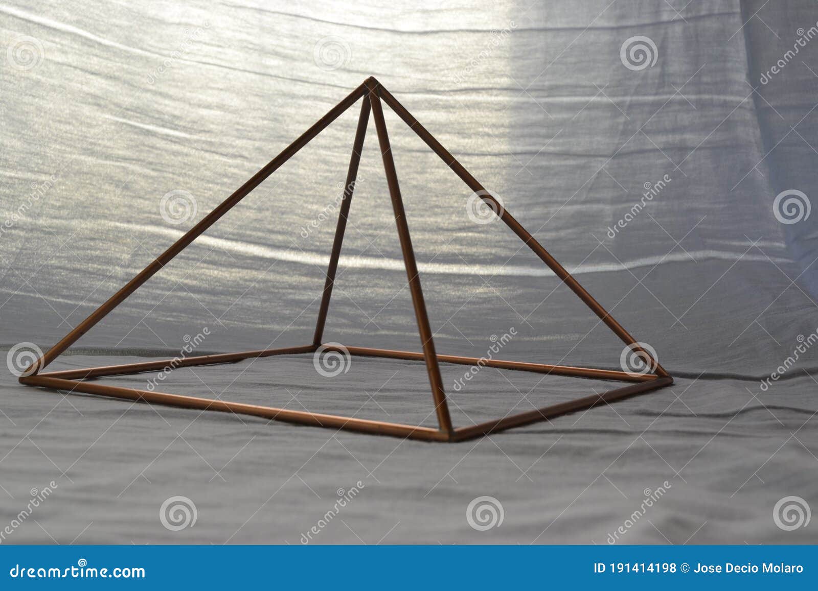 Copper Pyramid with Lighting, White Background, Side View, Backlighting ...