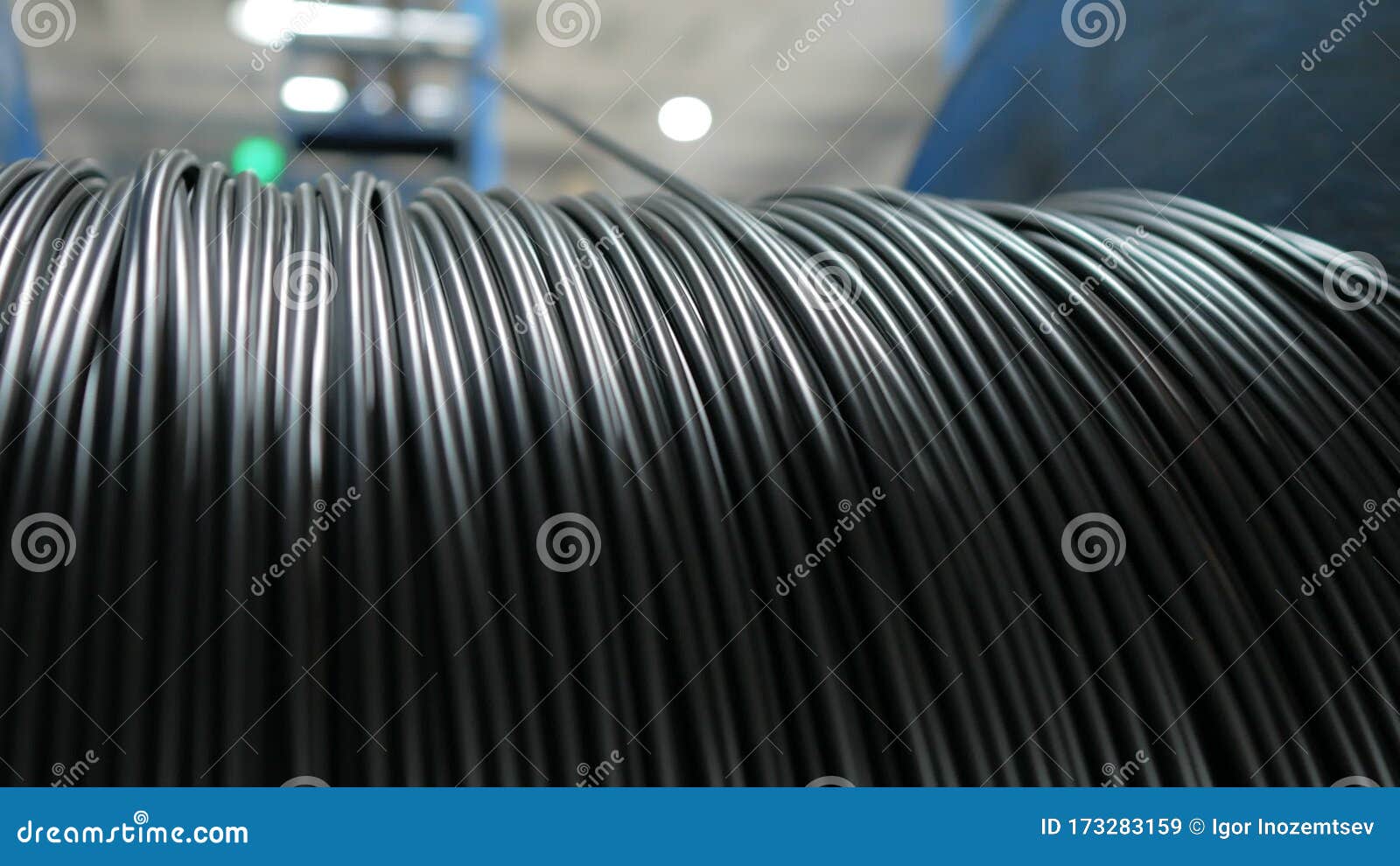 Winding Cable on a Rotating Coil. Production of Electric Cable. Stock ...