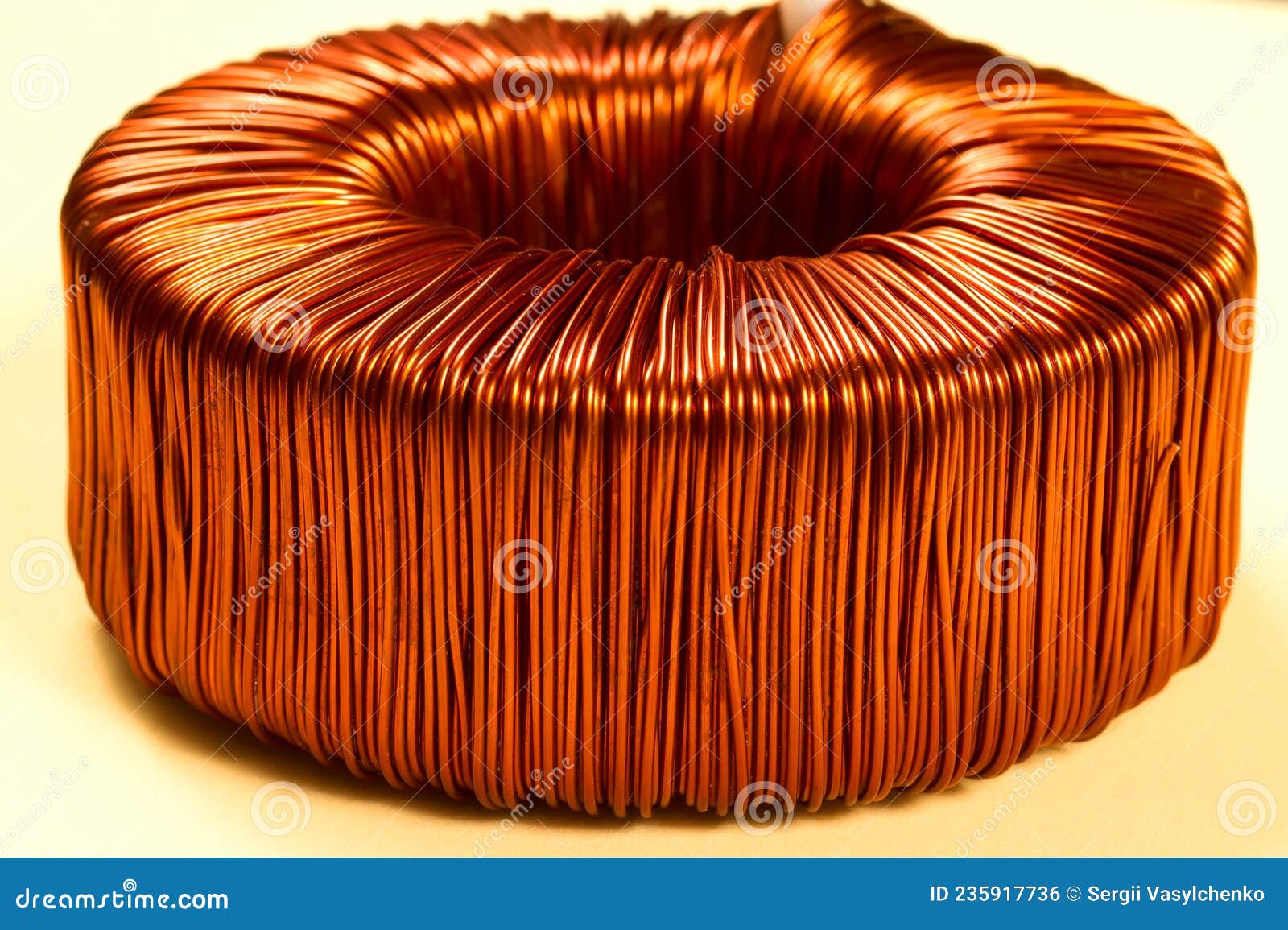 Toroidal Transformer With A Winding Of Copper Wire Of Bright Color